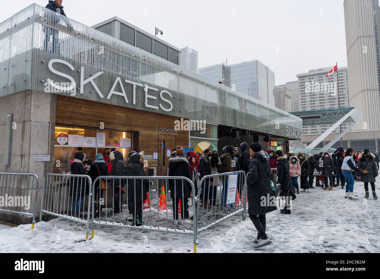 Toronto, Ontario, Canada - December 18 2021 : People doing ice skating ...