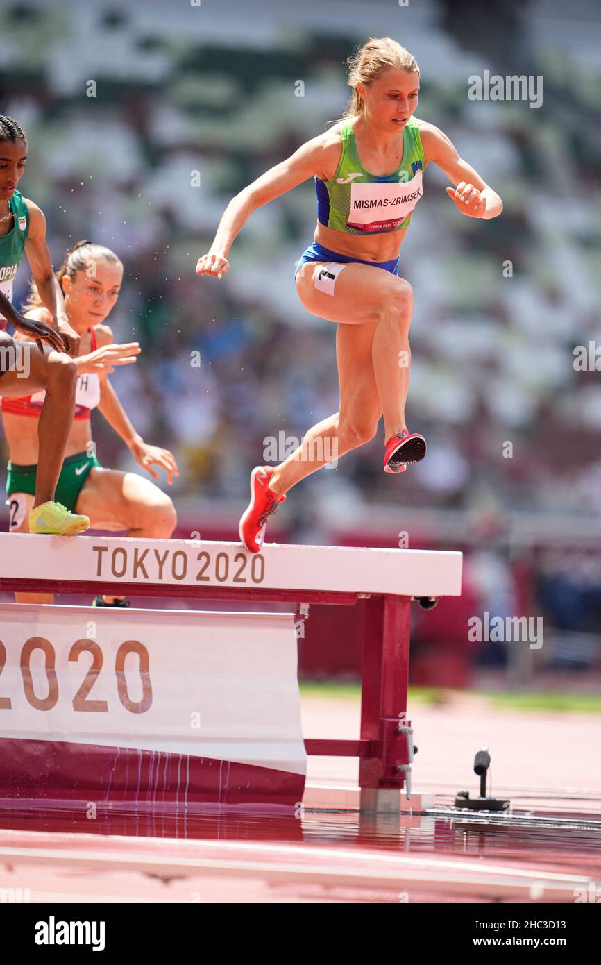 Marusa Mismas-Zrimsek participating in the 3000 meters steeplechase at ...