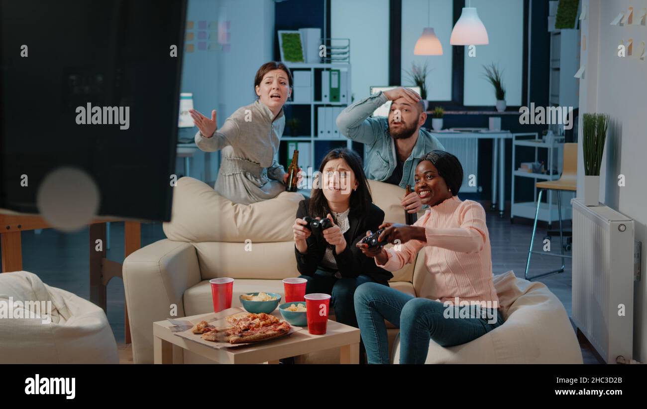 Coworkers playing video games hi-res stock photography and images - Alamy