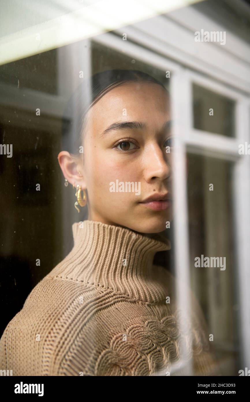 Woman reflected window hi-res stock photography and images - Alamy