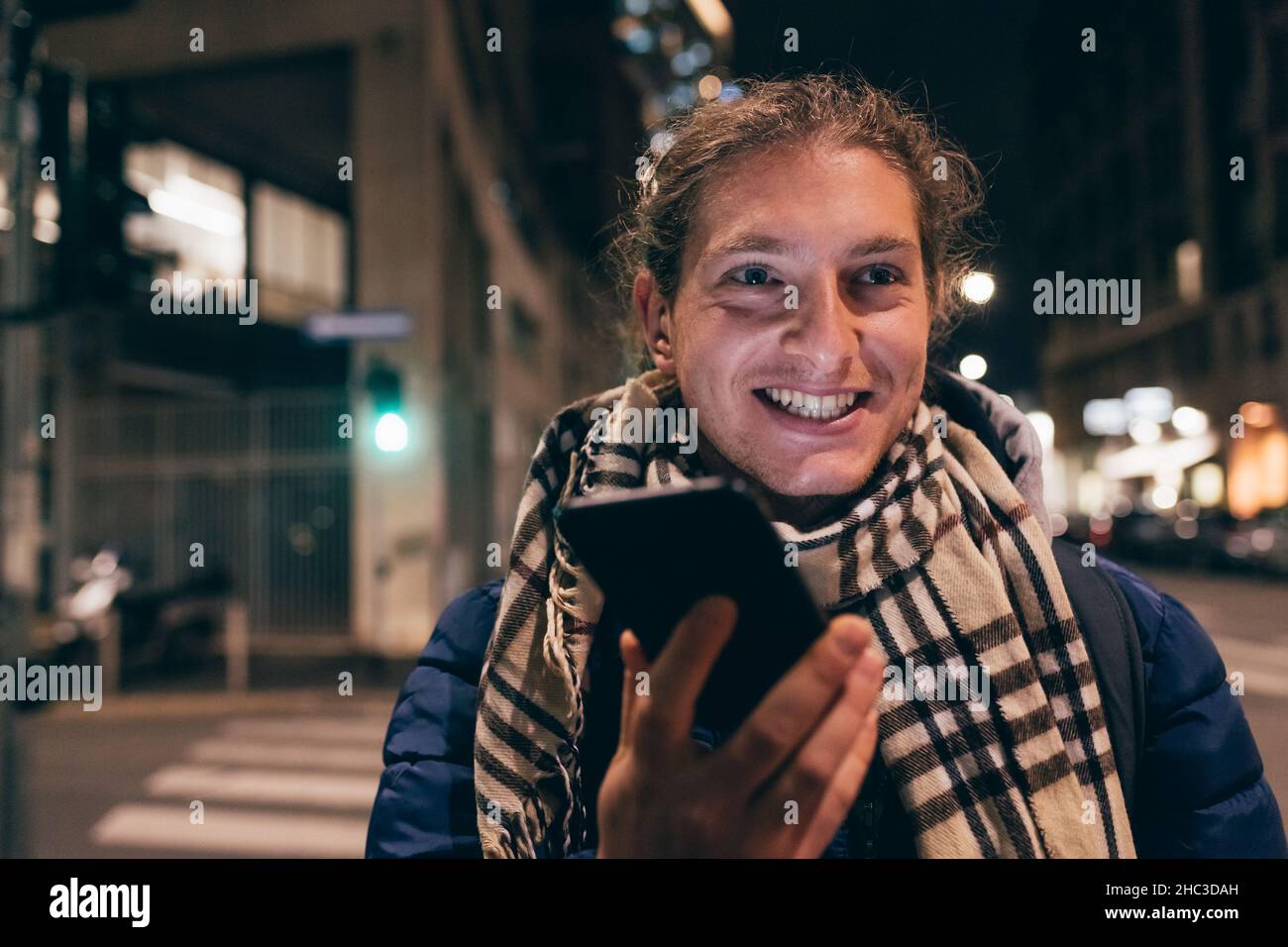 Young man talking phone italy hi-res stock photography and images - Alamy