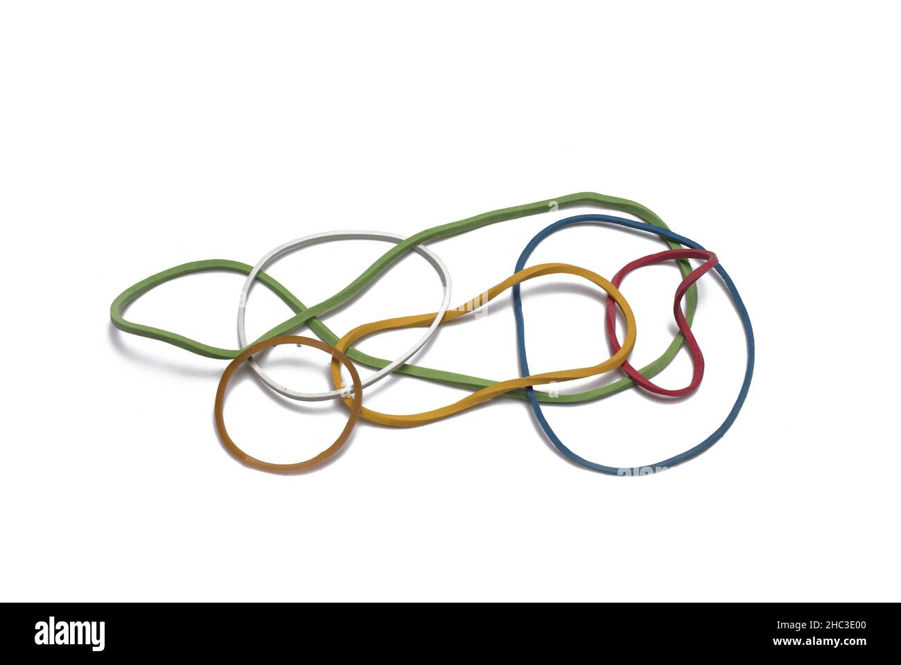 Close up of a heap of several different colored rubber bands isolated ...
