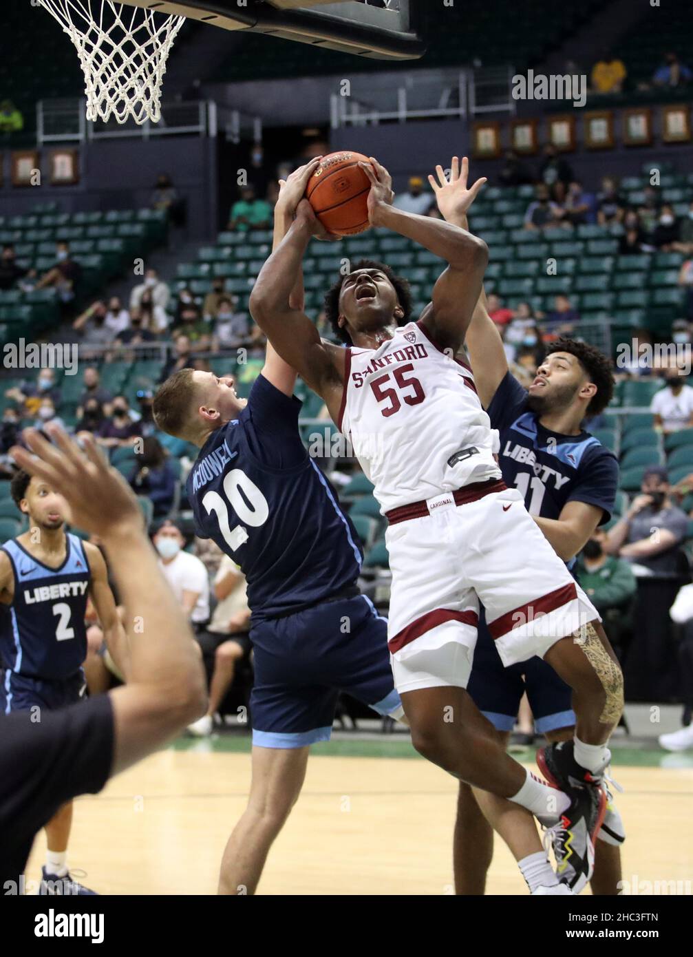 December 23, 2021 - Liberty Flames guard Keegan McDowell #20 defends a ...