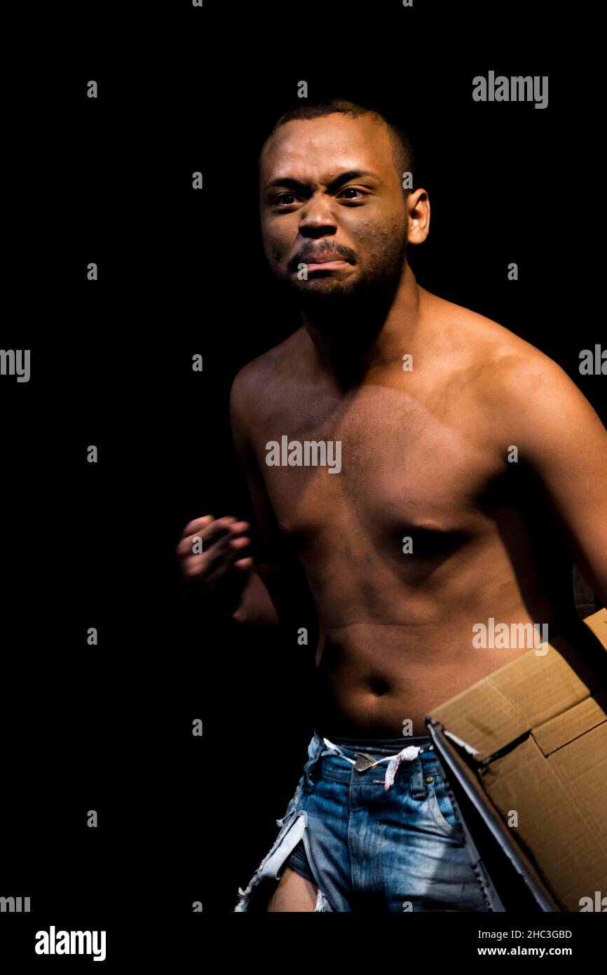 Actor on stage represents a dramatic character. Scene in a theater in ...