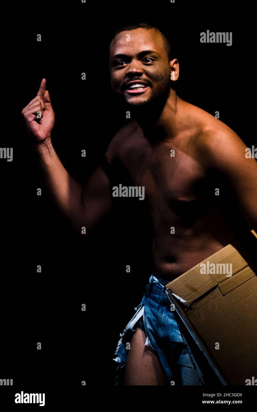 Actor on stage represents a dramatic character. Scene in a theater in ...