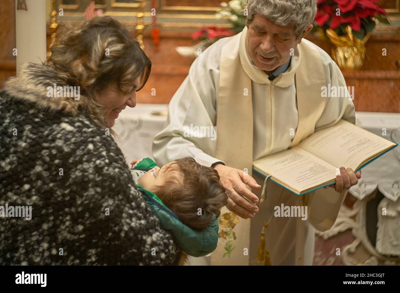 Catholic baptism infant hi-res stock photography and images - Alamy