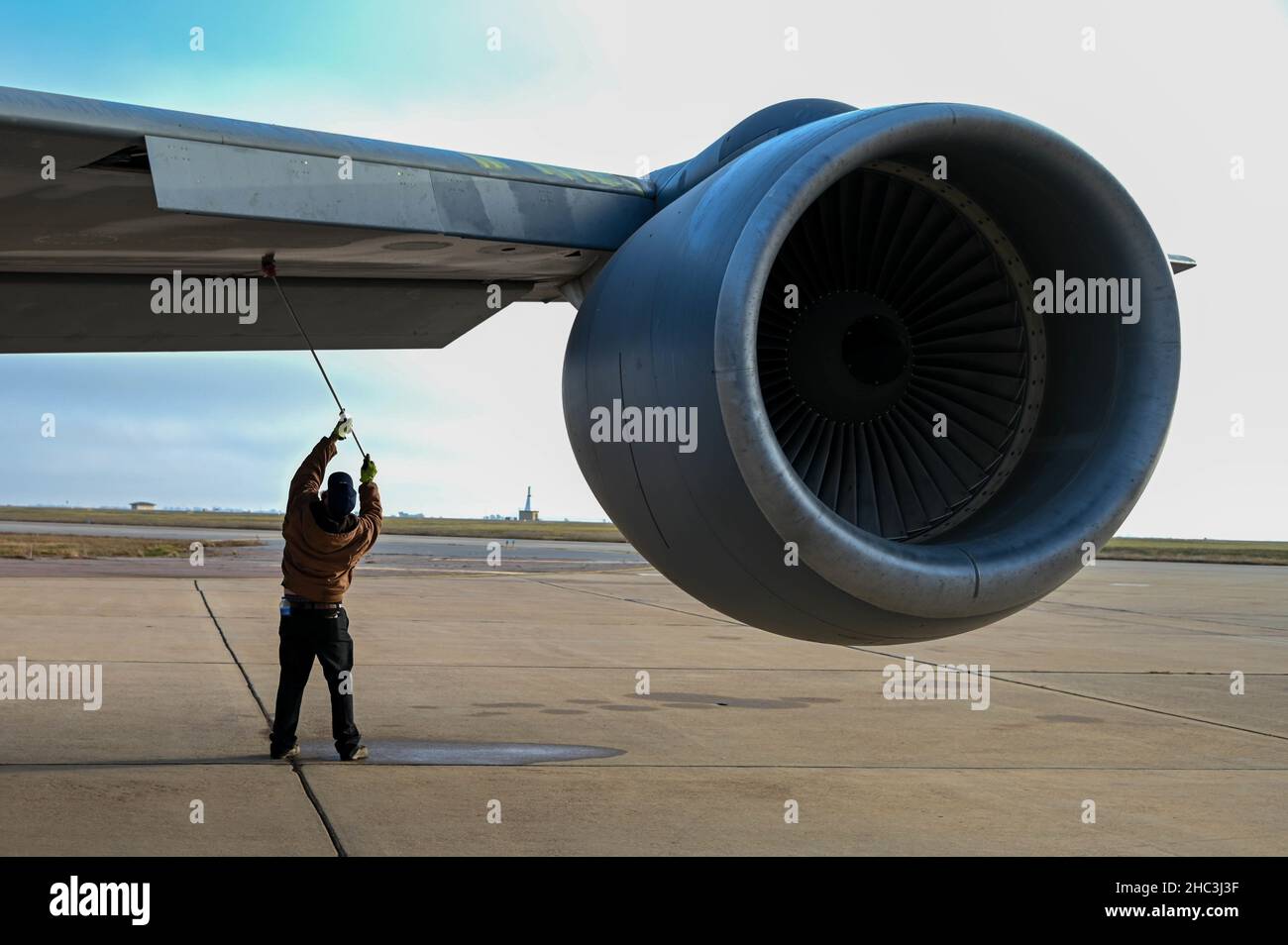A KC-135 Stratotanker maintainer prepares a KC-135 for takeoff before ...