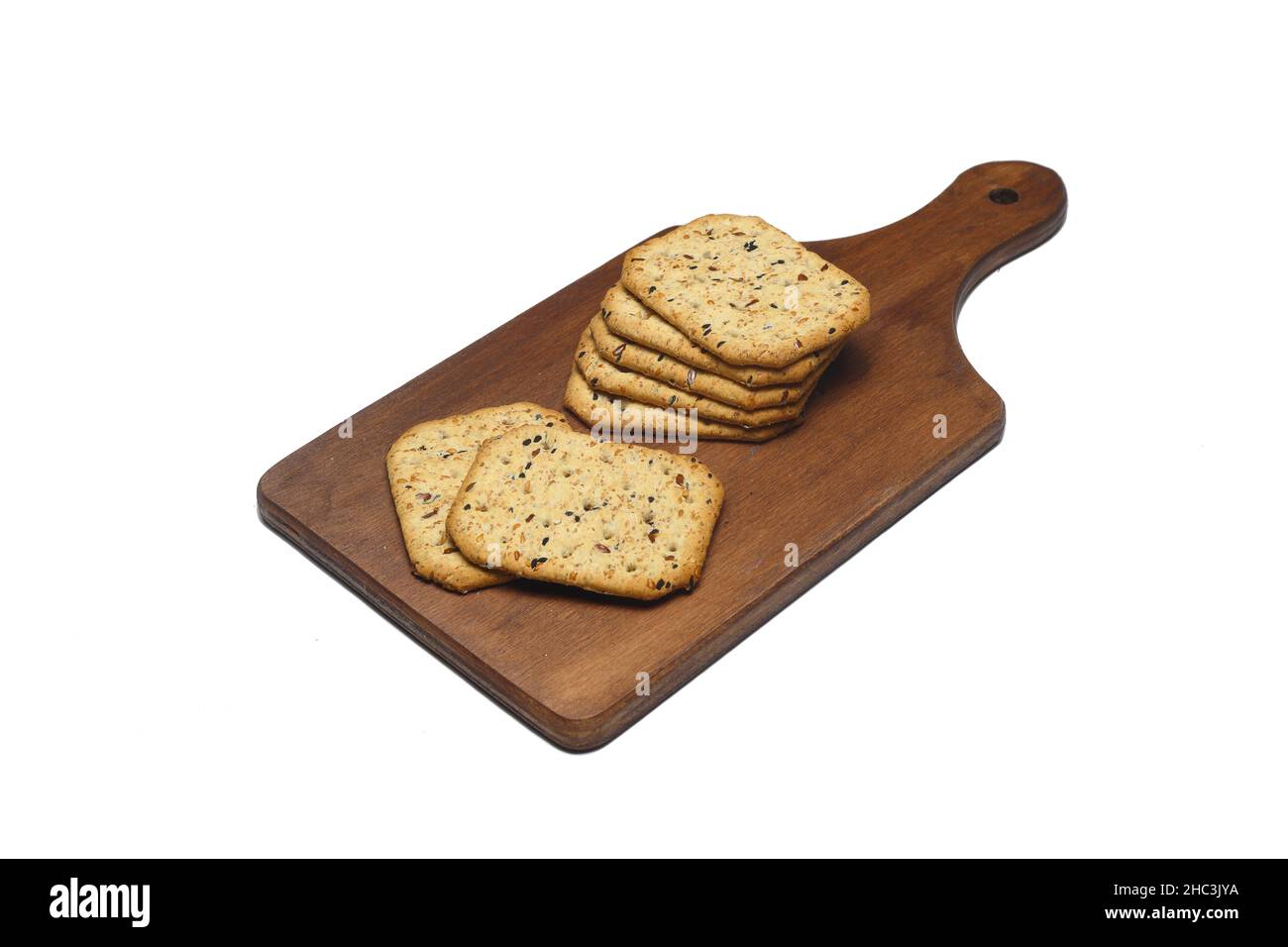 Pile of crackers with different seeds isolated on white background ...