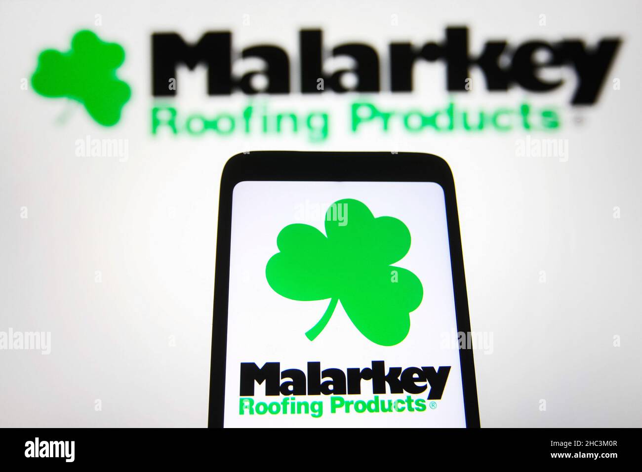 In this photo illustration, the Malarkey Roofing Products logo is seen ...