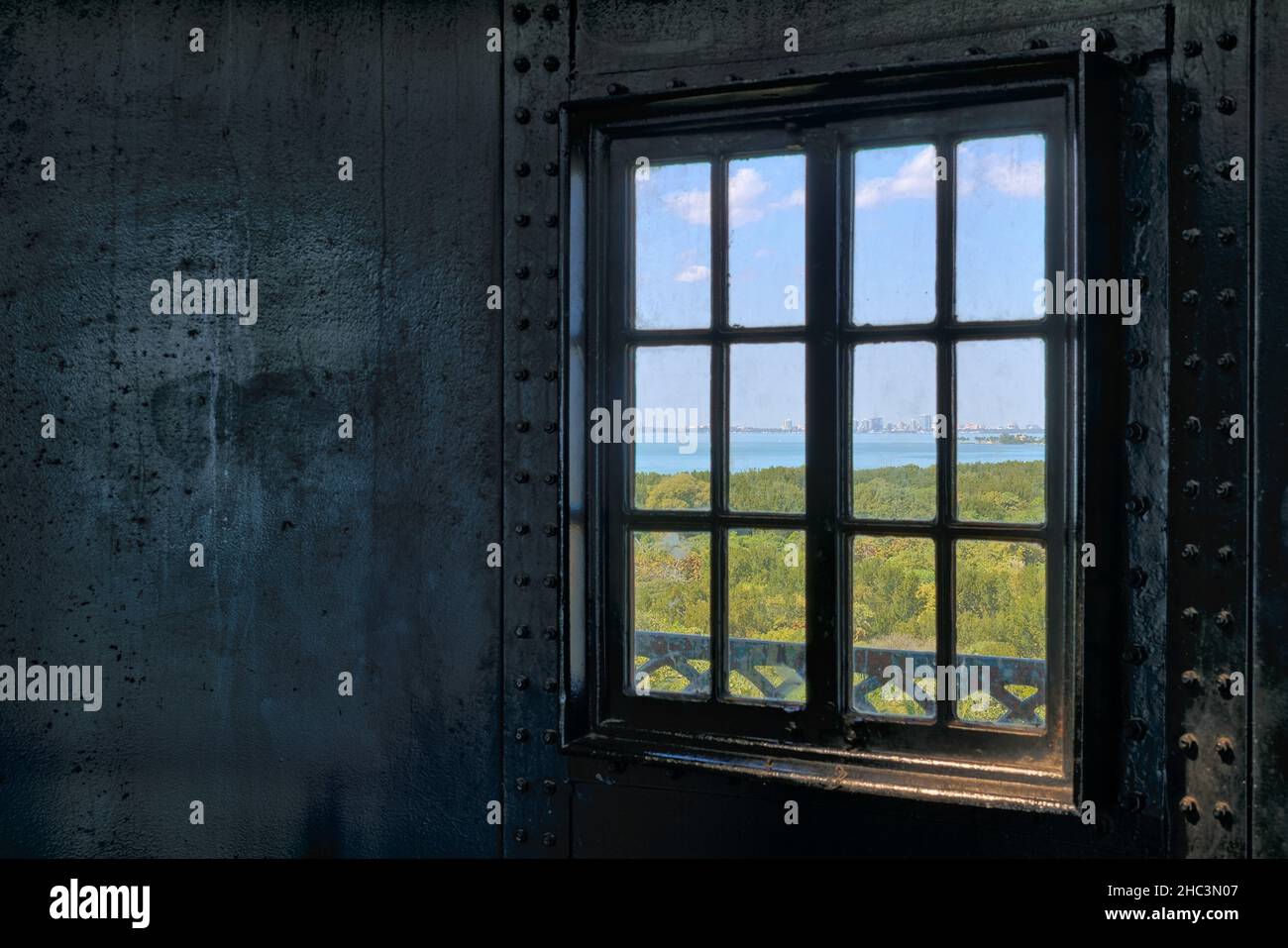 Looking through a lighthouse window at the ocean Stock Photo - Alamy