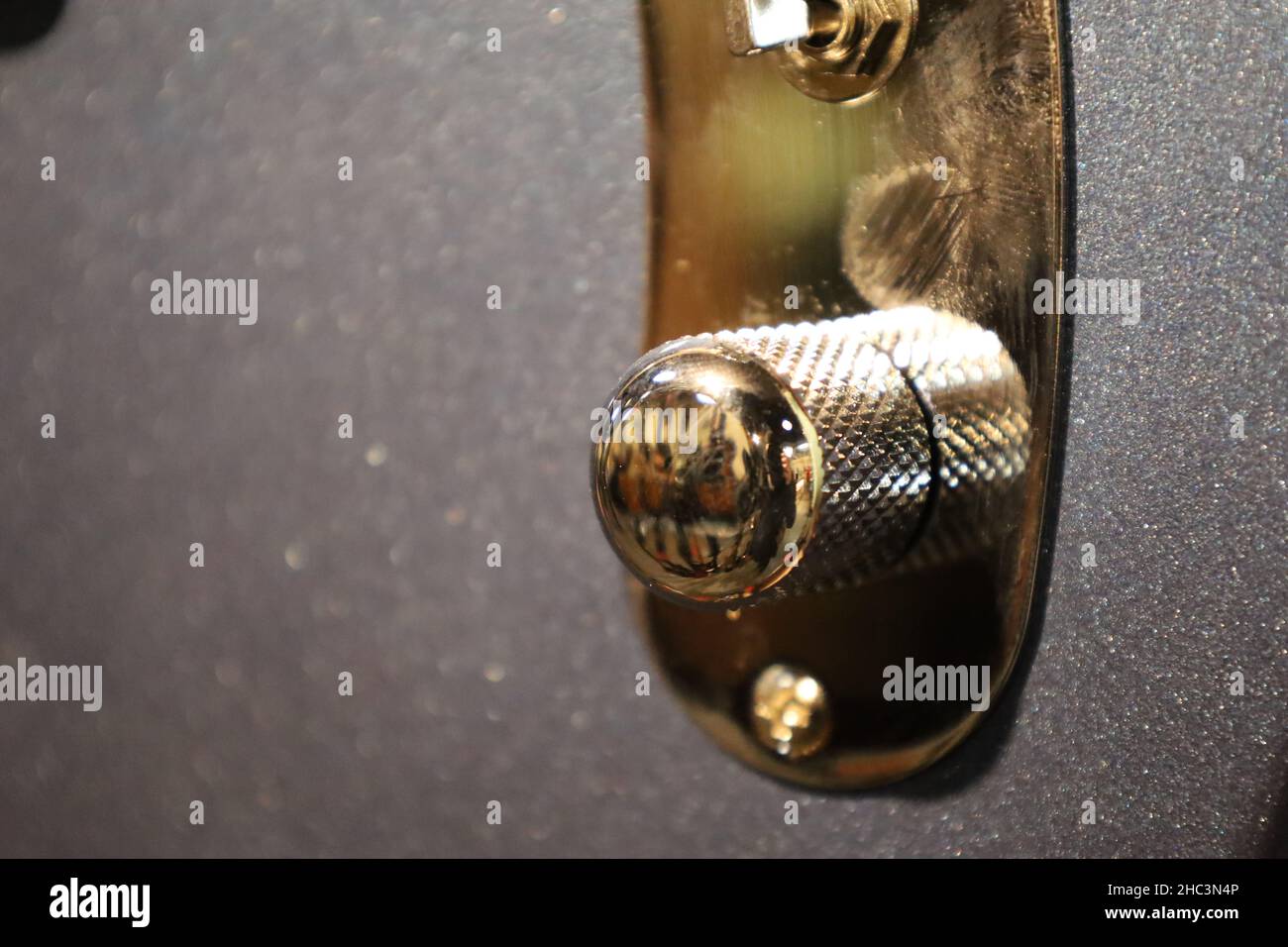 electric guitar master volume knob analog synthesizer Stock Photo - Alamy