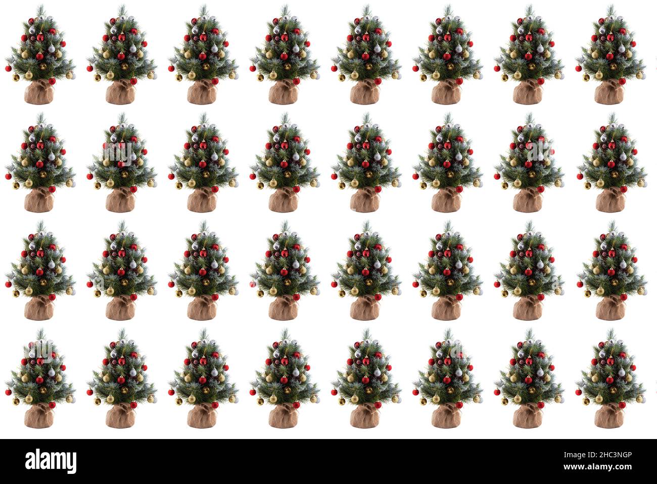 Christmas pine trees in pots wrapped in cloth and decorated with ...