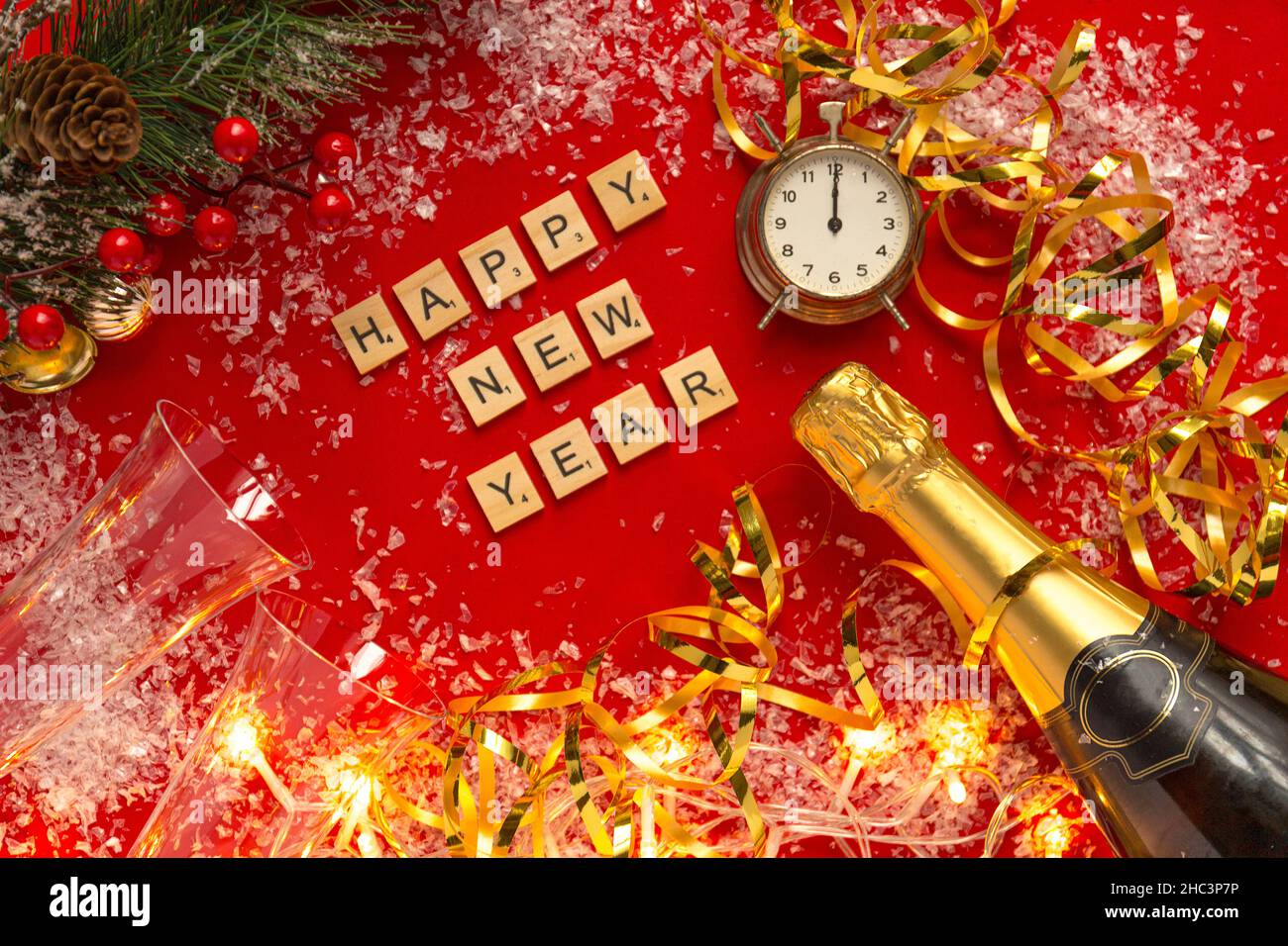 Red Christmas theme background with lettered wooden tiles forming the ...