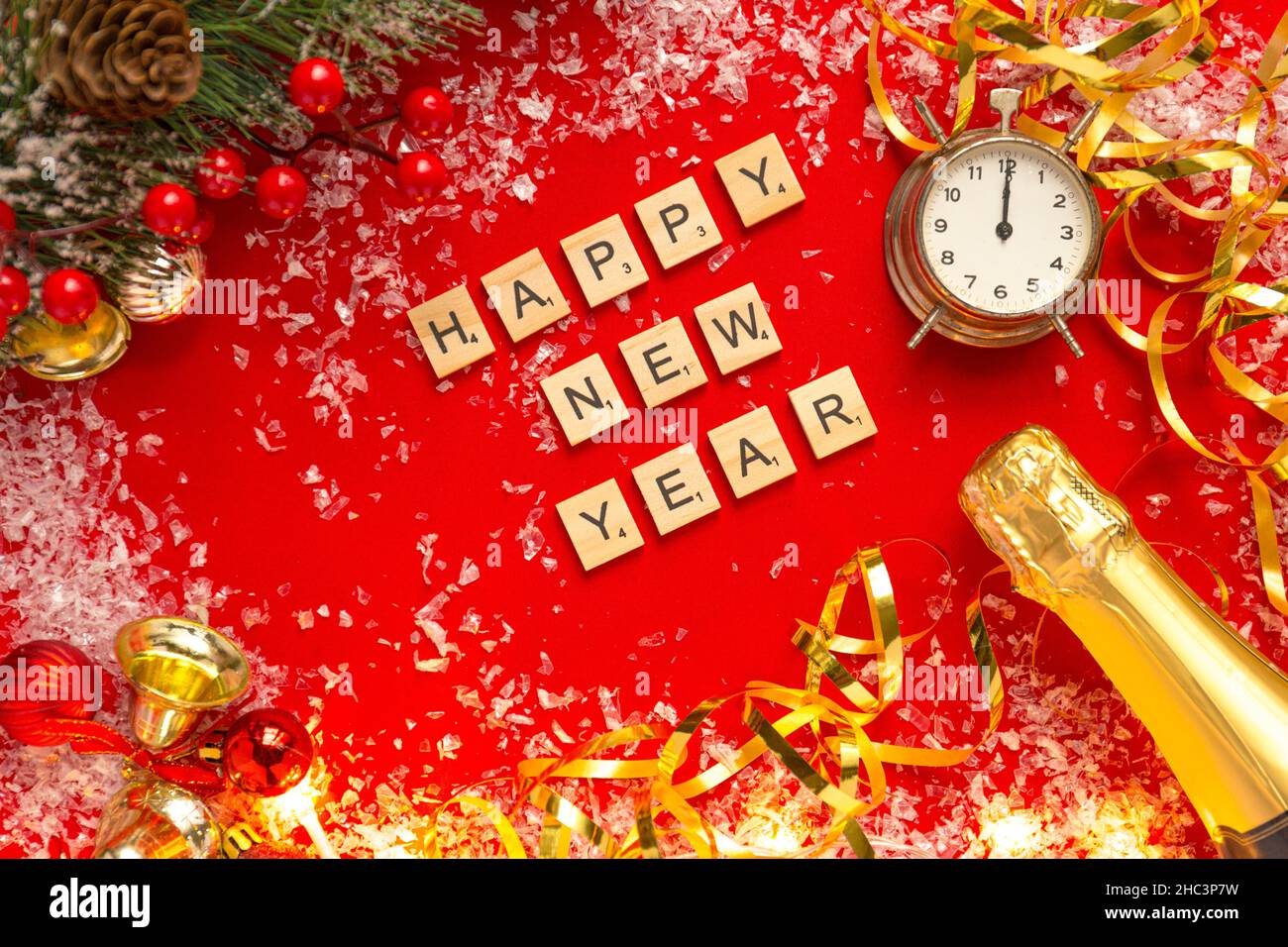 Red Christmas theme background with lettered wooden tiles forming the ...