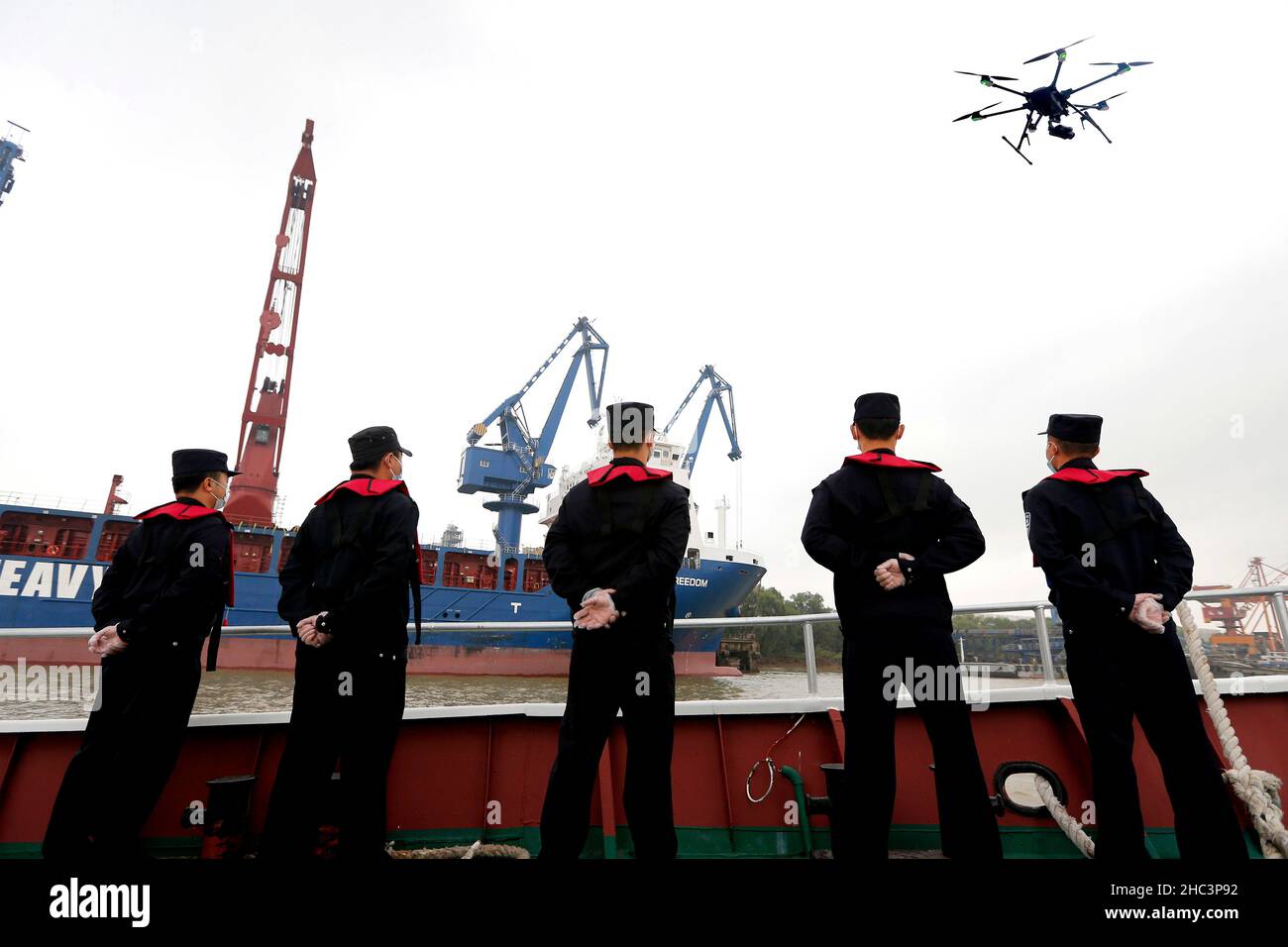 NANJING, CHINA - DECEMBER 24, 2021 - A police officer operating a ...