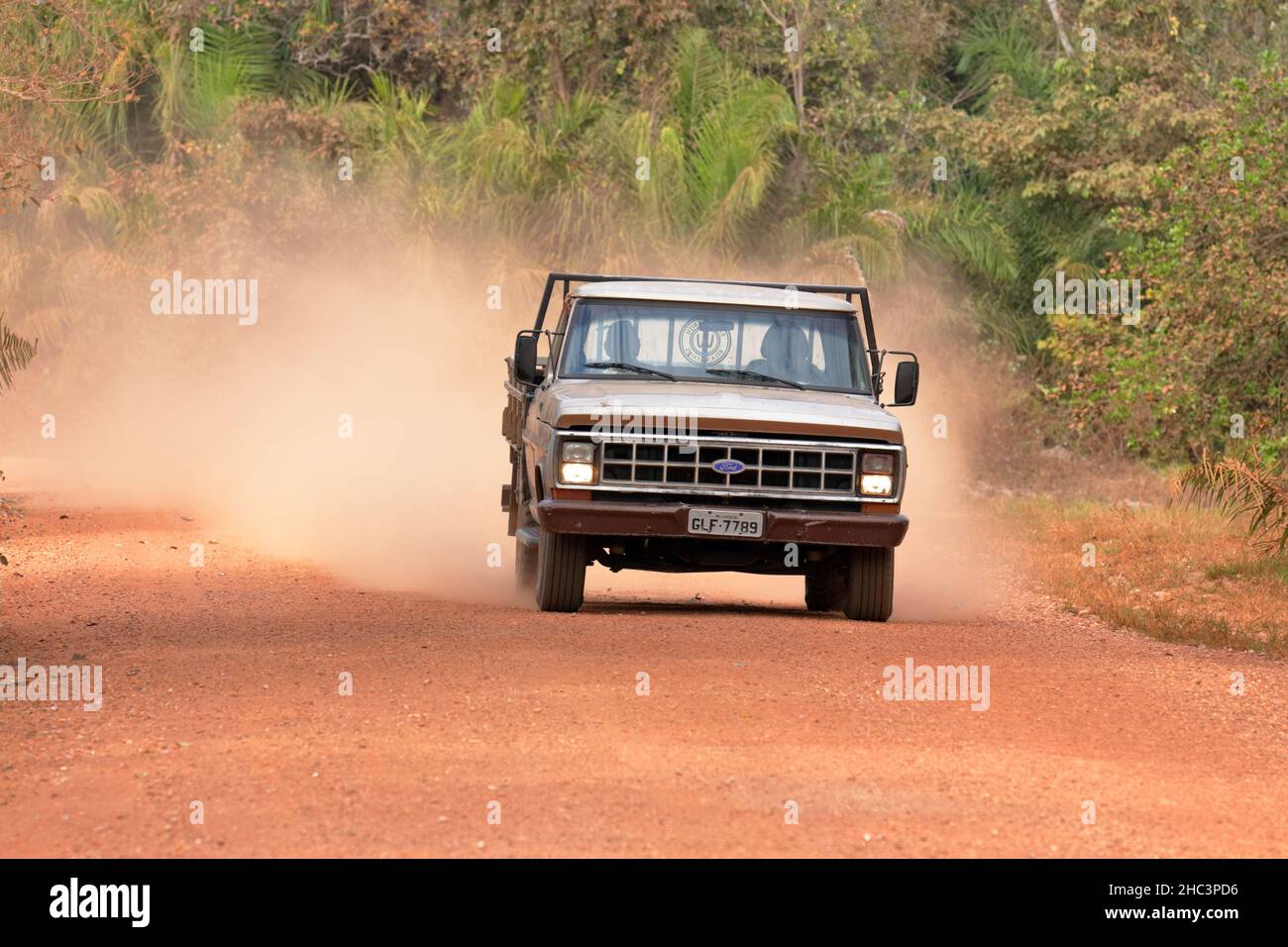 Driving a dirt road in dry season Stock Photo - Alamy