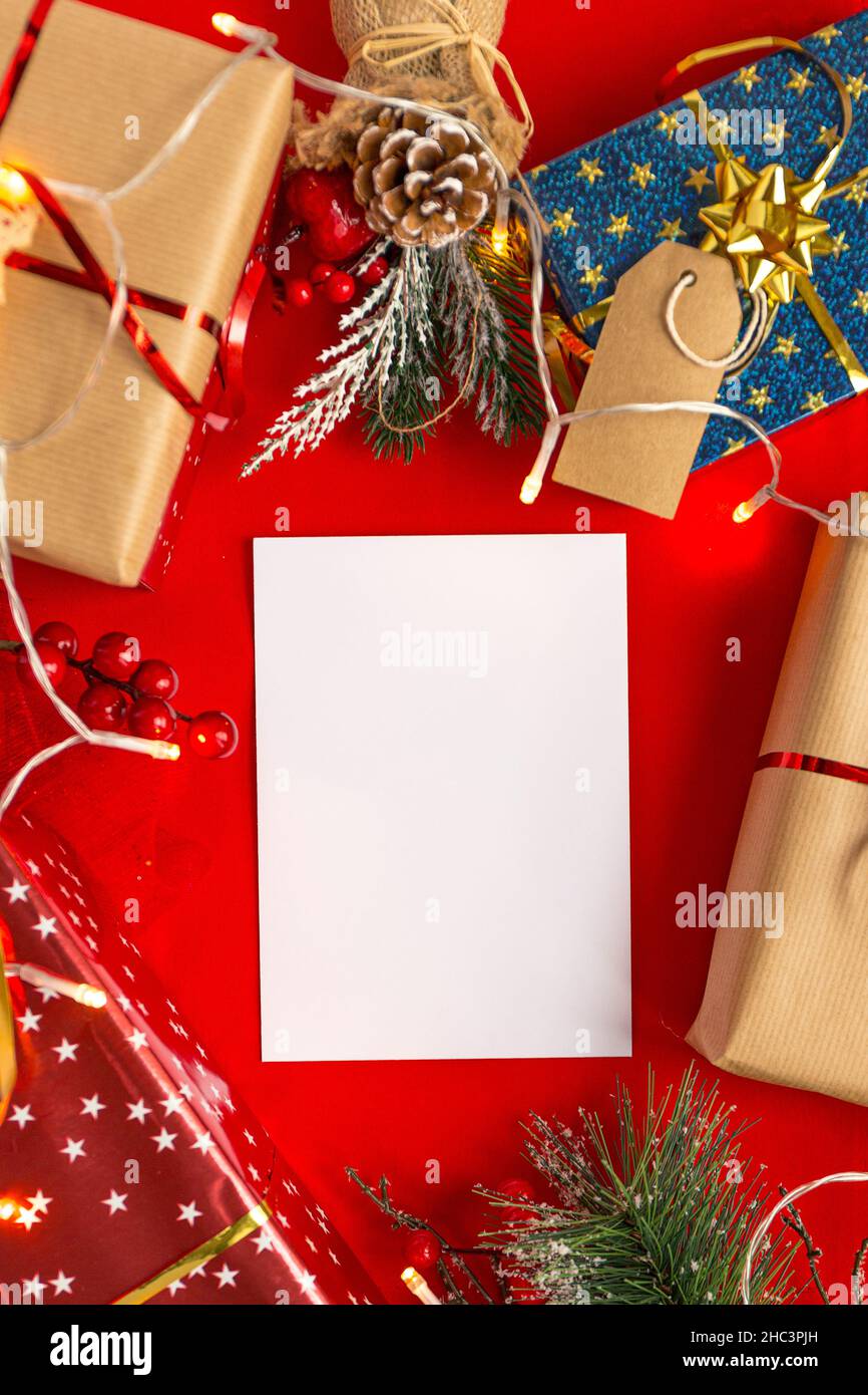 Blank card, christmas background with gifts and Christmas tree lights ...