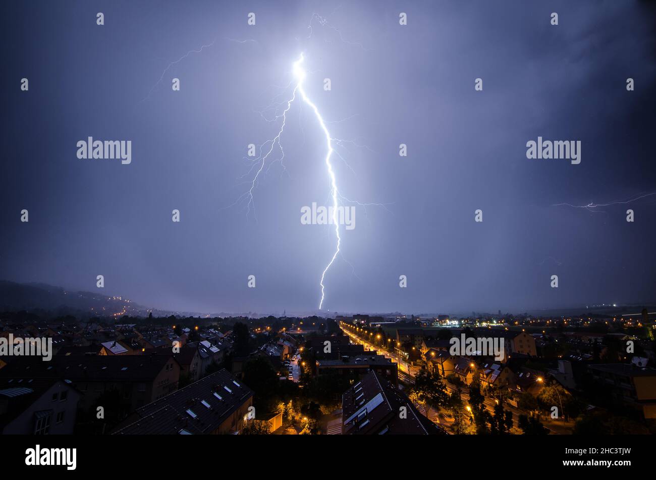 Beautiful scene of the lightning striking in the night sky over ...