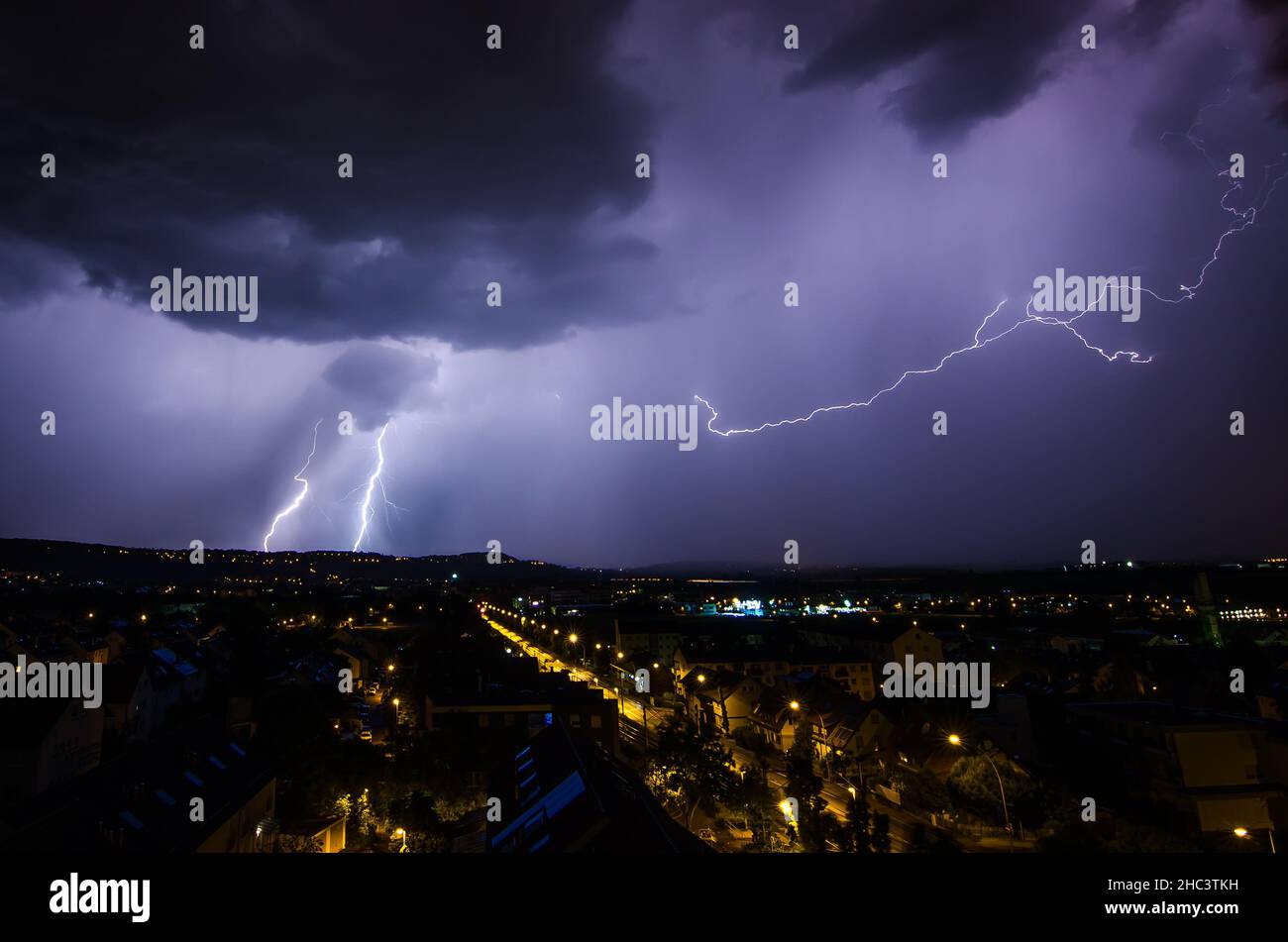 Beautiful scene of the lightning striking in the night sky over ...