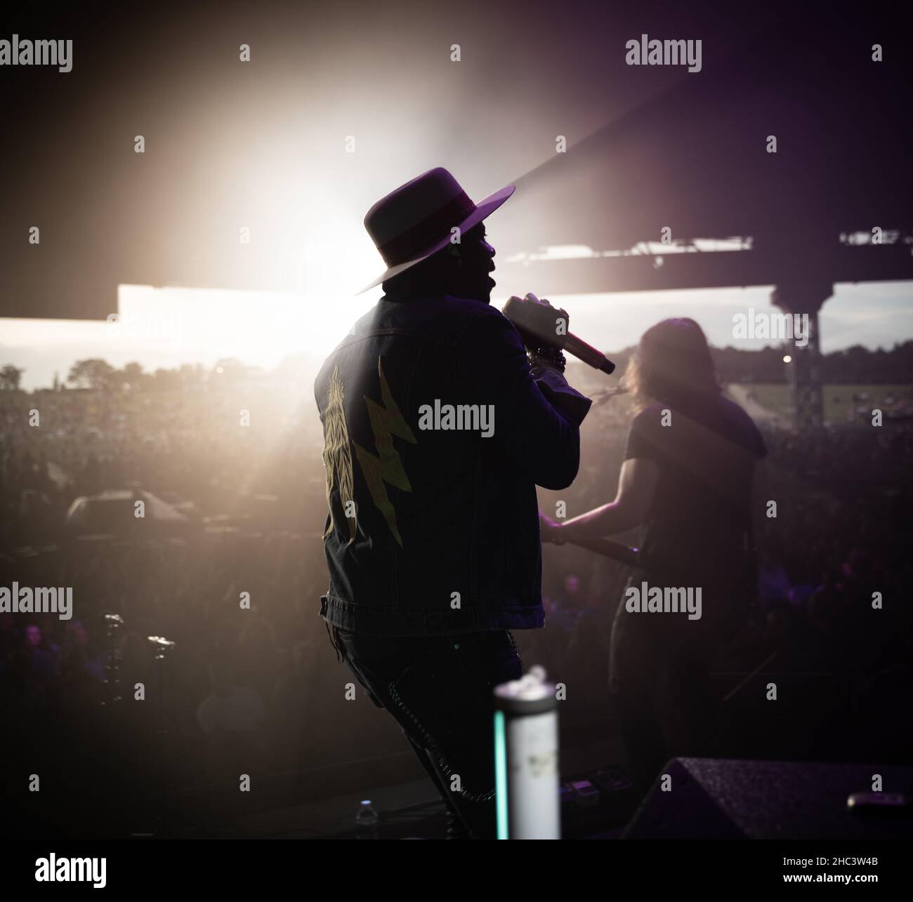 Musician performing live on stage to a crowd of people in Toronto ...