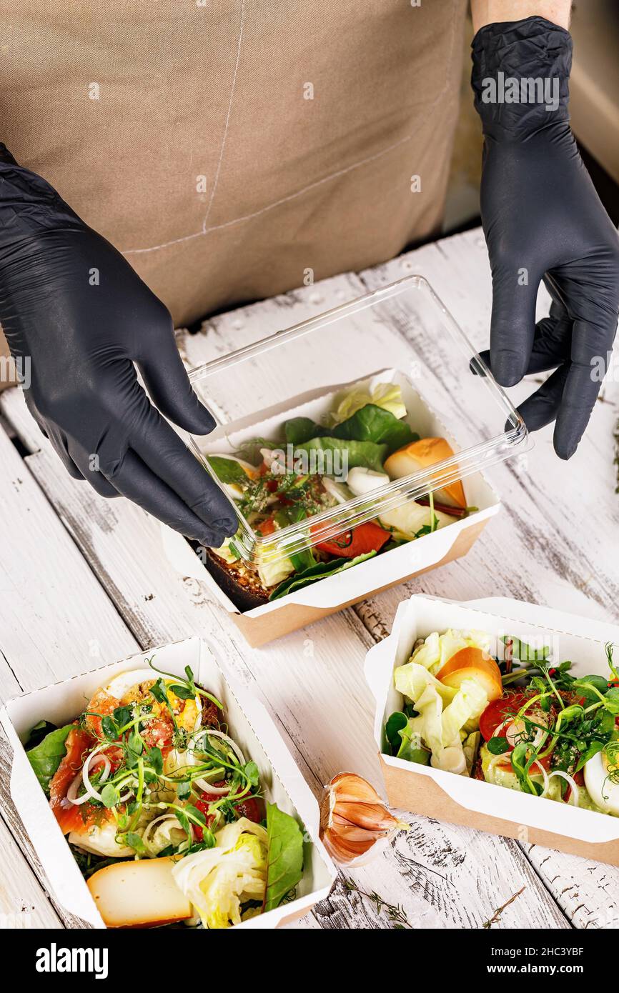 Lunch box in hands hi-res stock photography and images - Alamy