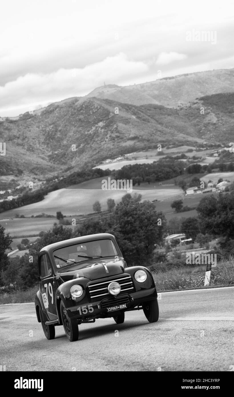 CAGLI , ITALY - OTT 24 - 2020 : FIAT 500 C on an old racing car in ...
