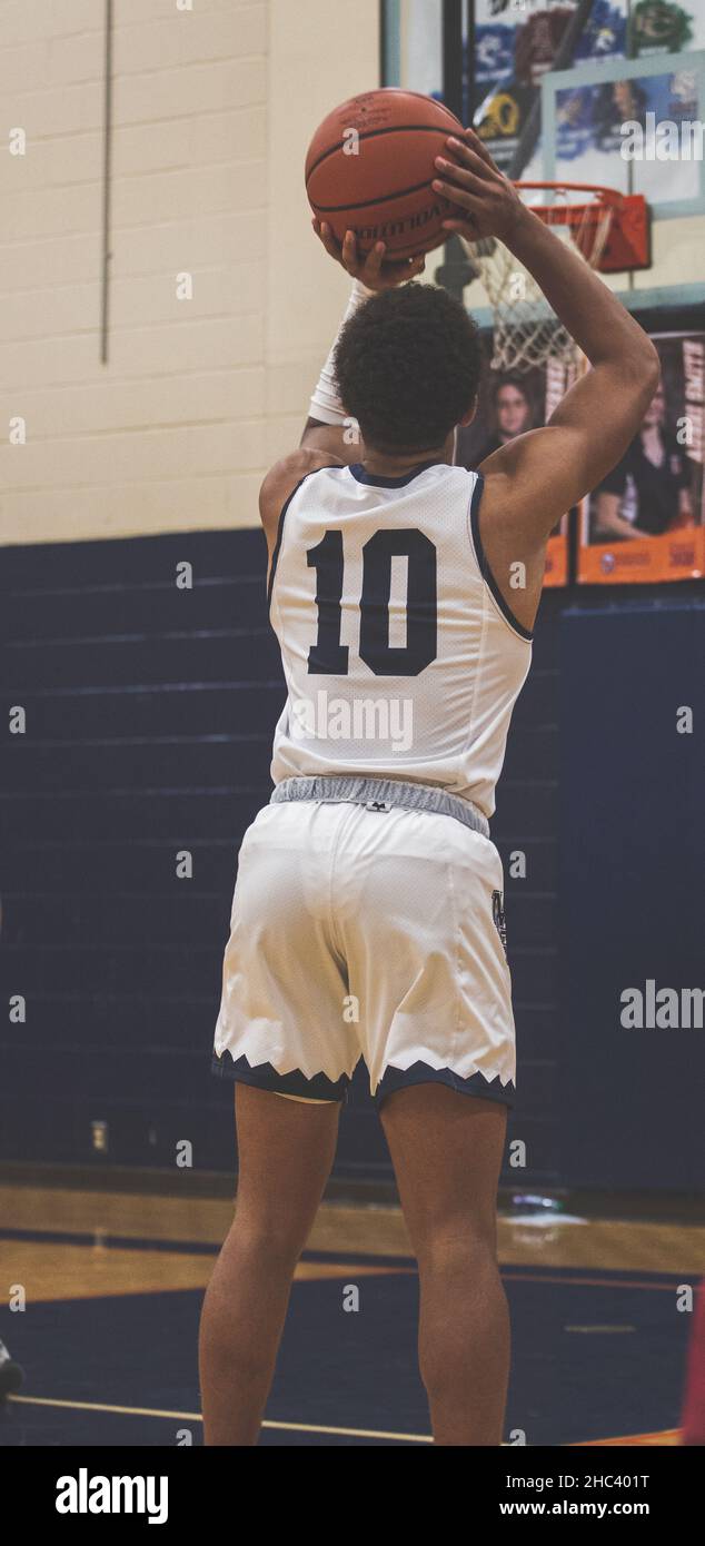 Vertical shot of the athlete playing basketball Stock Photo - Alamy