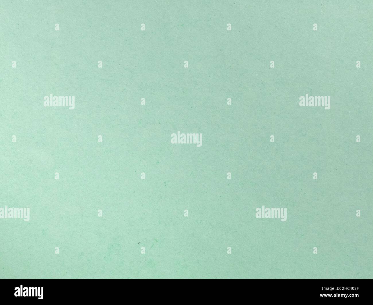 green cardboard texture useful as a background Stock Photo - Alamy