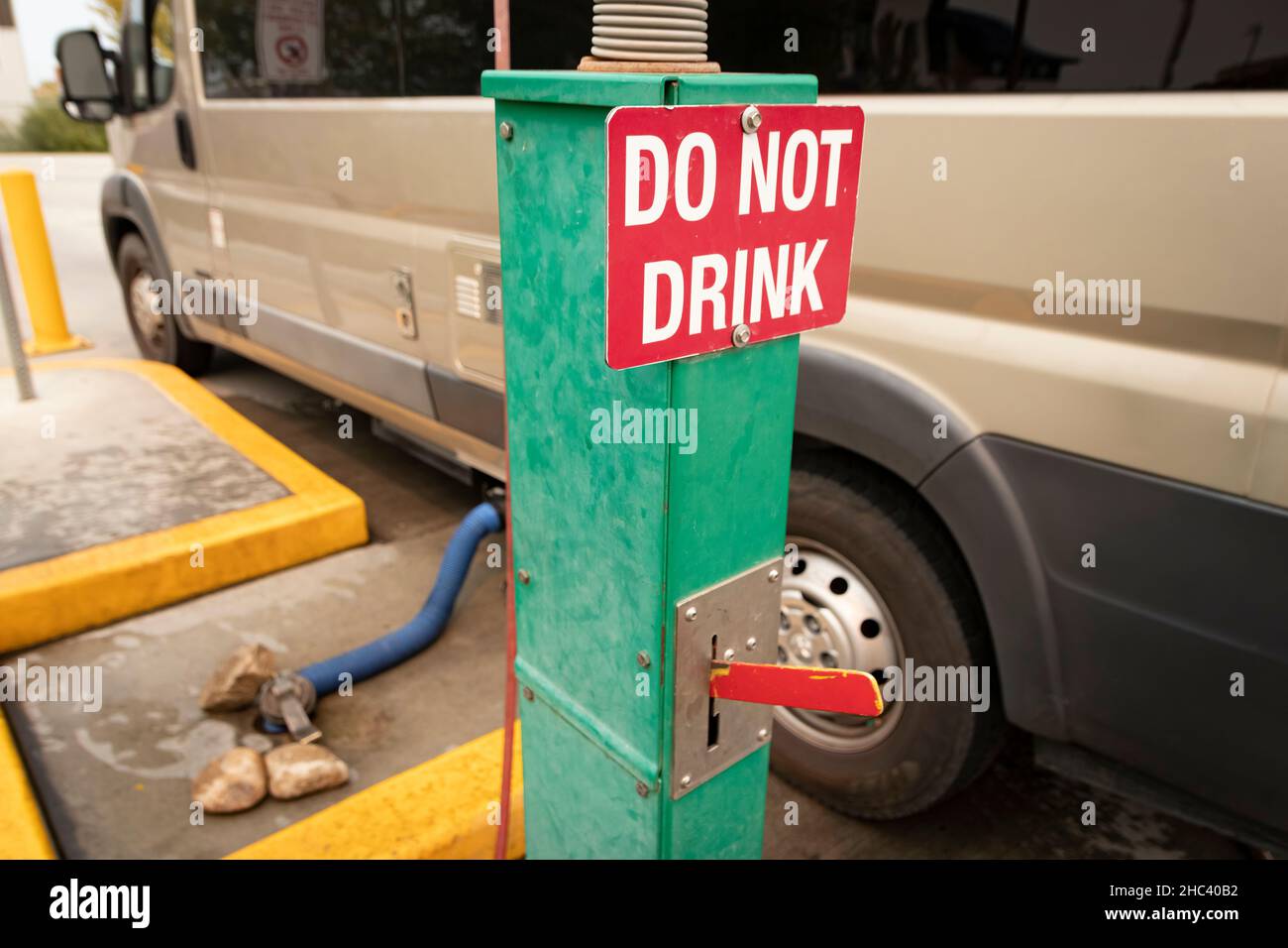 "DO NOT DRINK" sign at RV wastewater dumping station Stock Photo - Alamy
