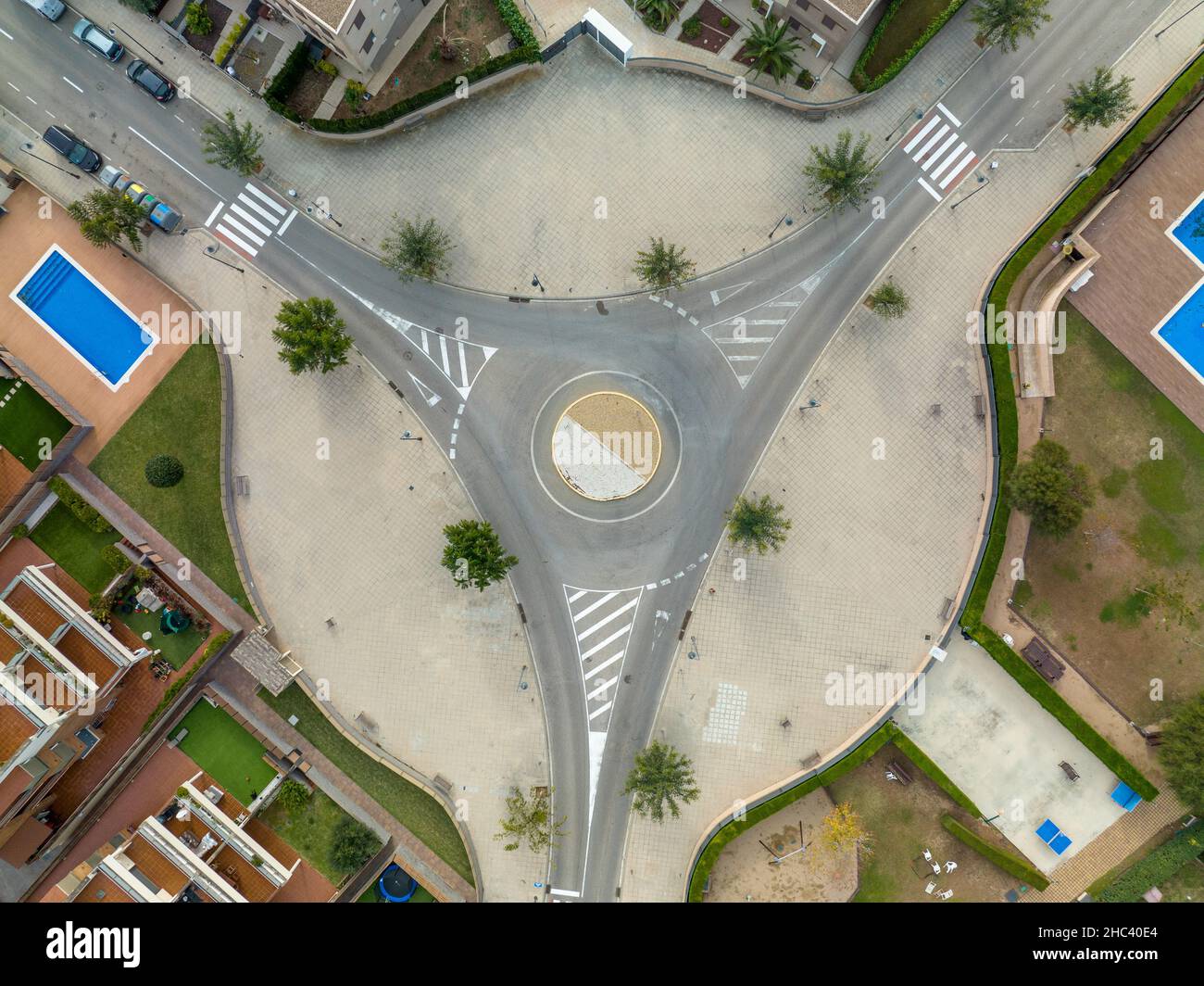 Aerial view of a roundabout with cars parked on the street Stock Photo ...
