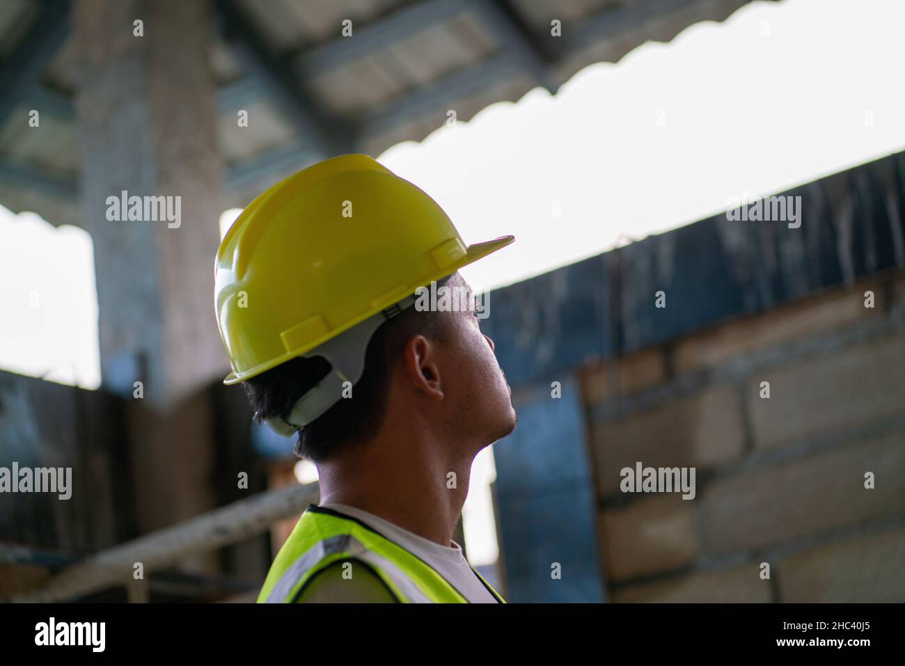 Foreman working in modern house building with notebook innspecture ...