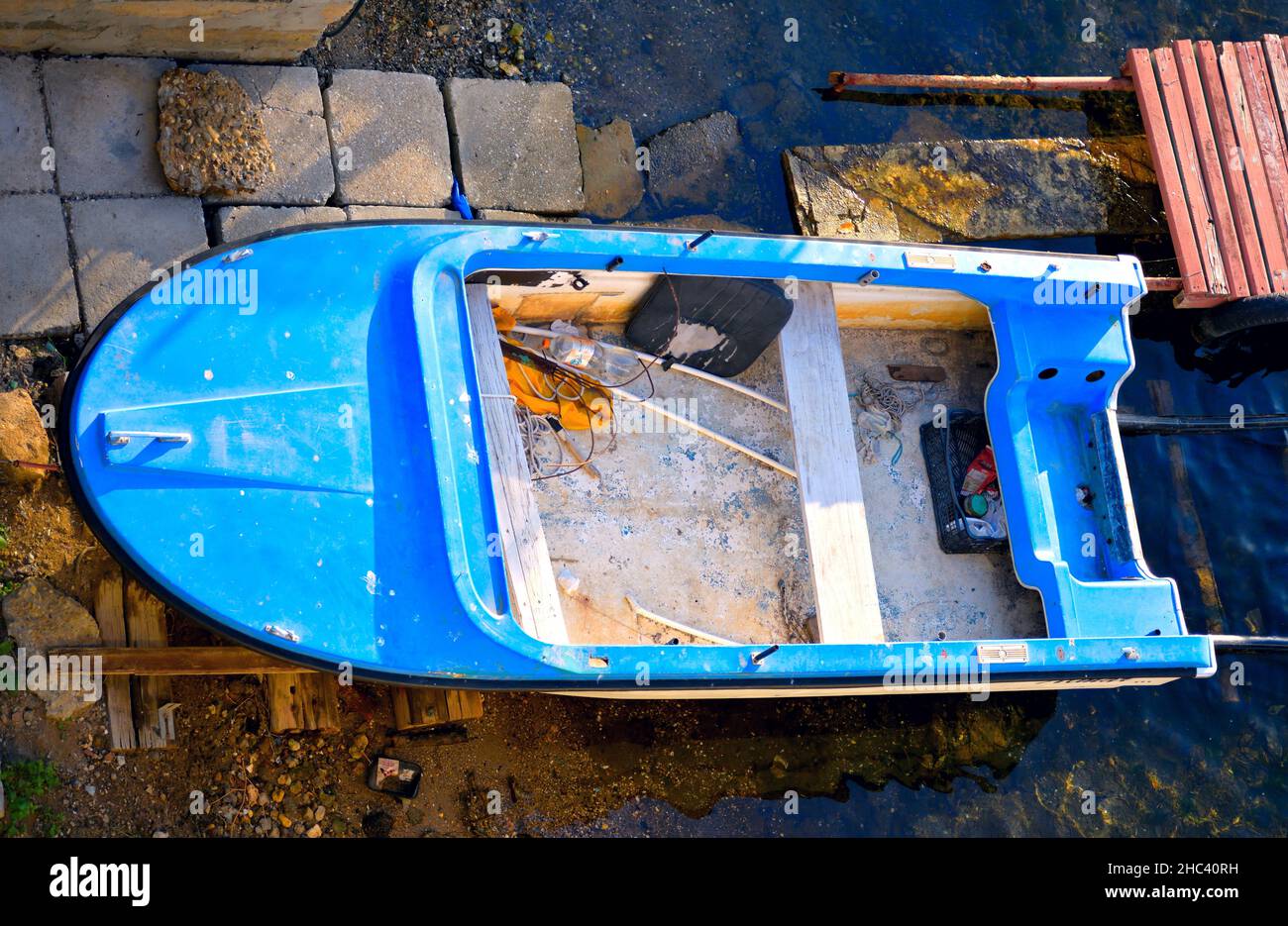 Old run down abandoned blue boat Stock Photo - Alamy