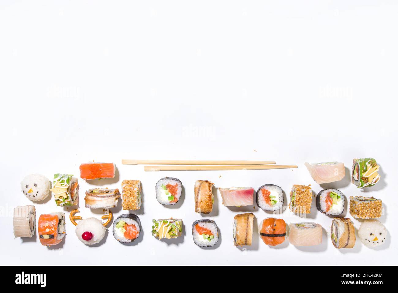 Christmas sushi set with funny decorated rolls like Xmas symbols ...
