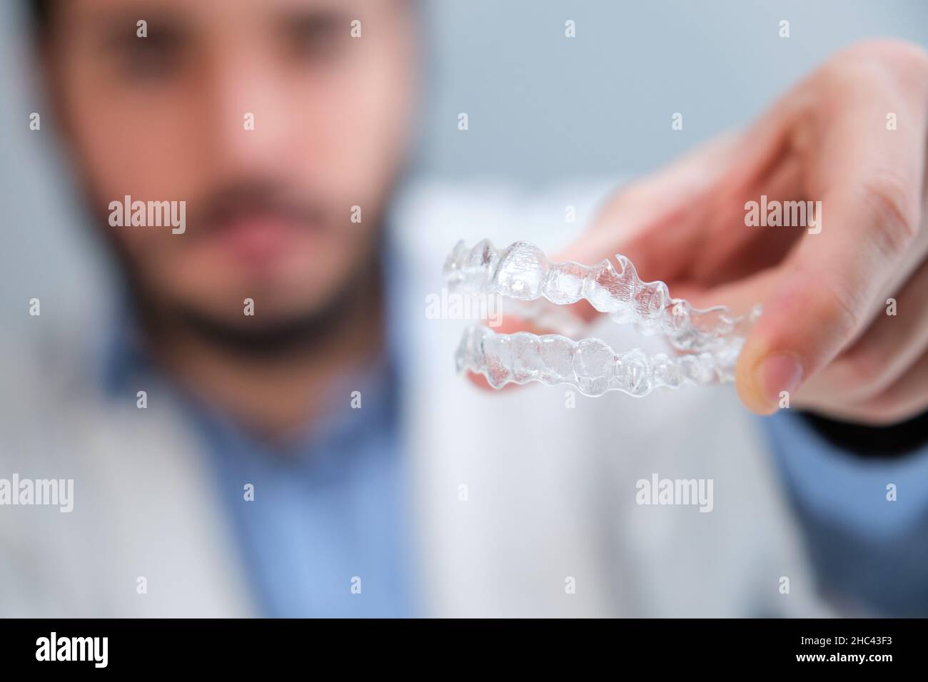 Dentist doctor holding aligners hi-res stock photography and images - Alamy