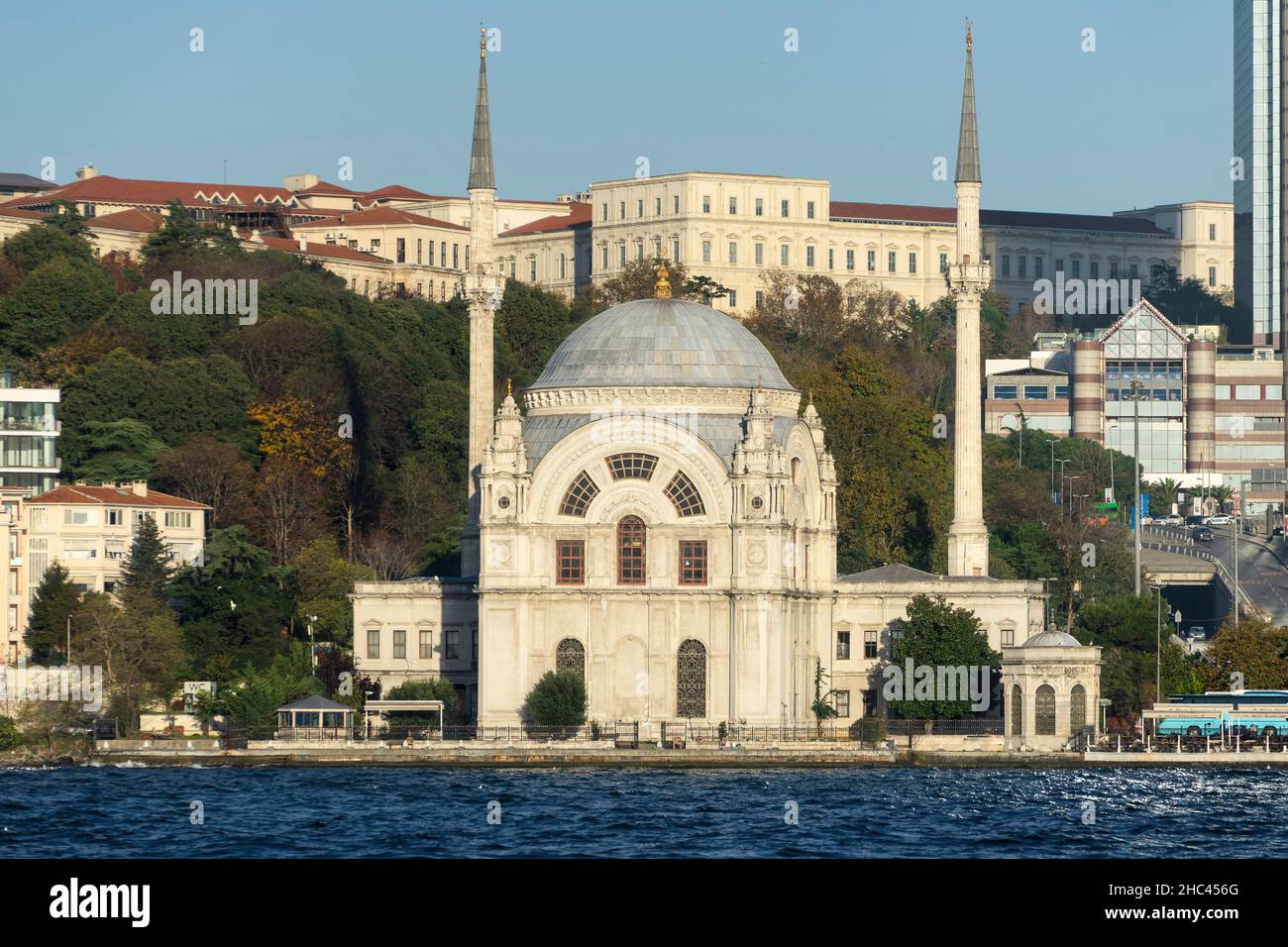 View of Dolmabahce Mosque on a sunny day. Dolmabahce Mosque is located ...