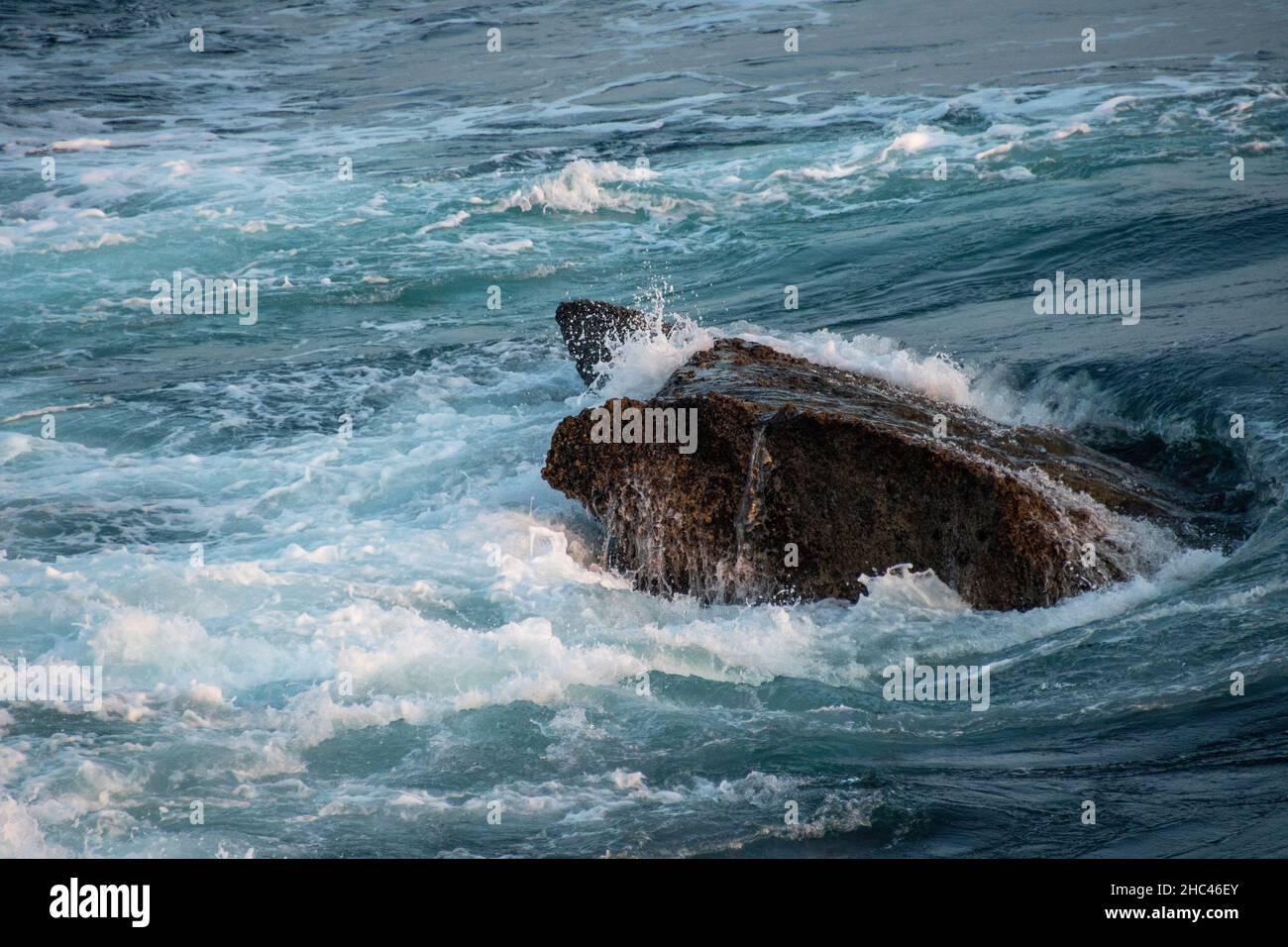 Beautiful beach big stone background hi-res stock photography and ...