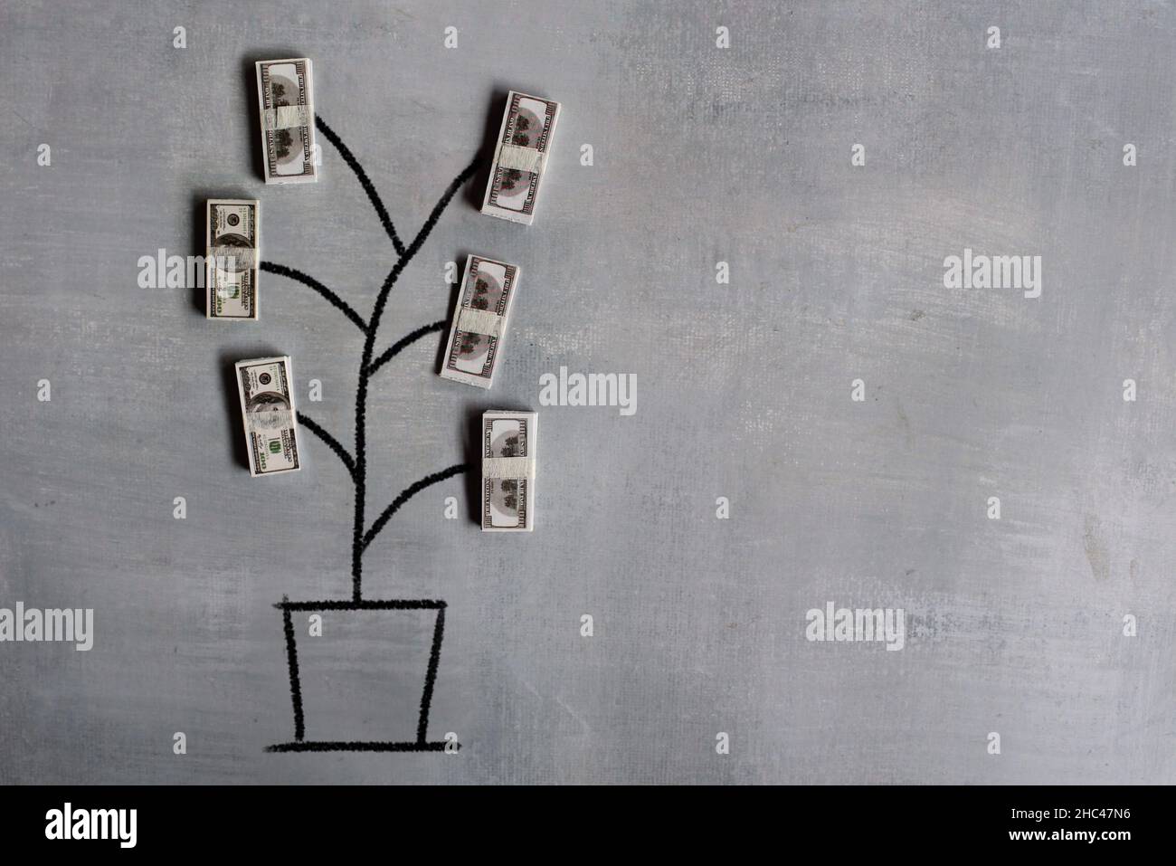 Economy and investment concept. Drawing of a tree with money. Copy ...