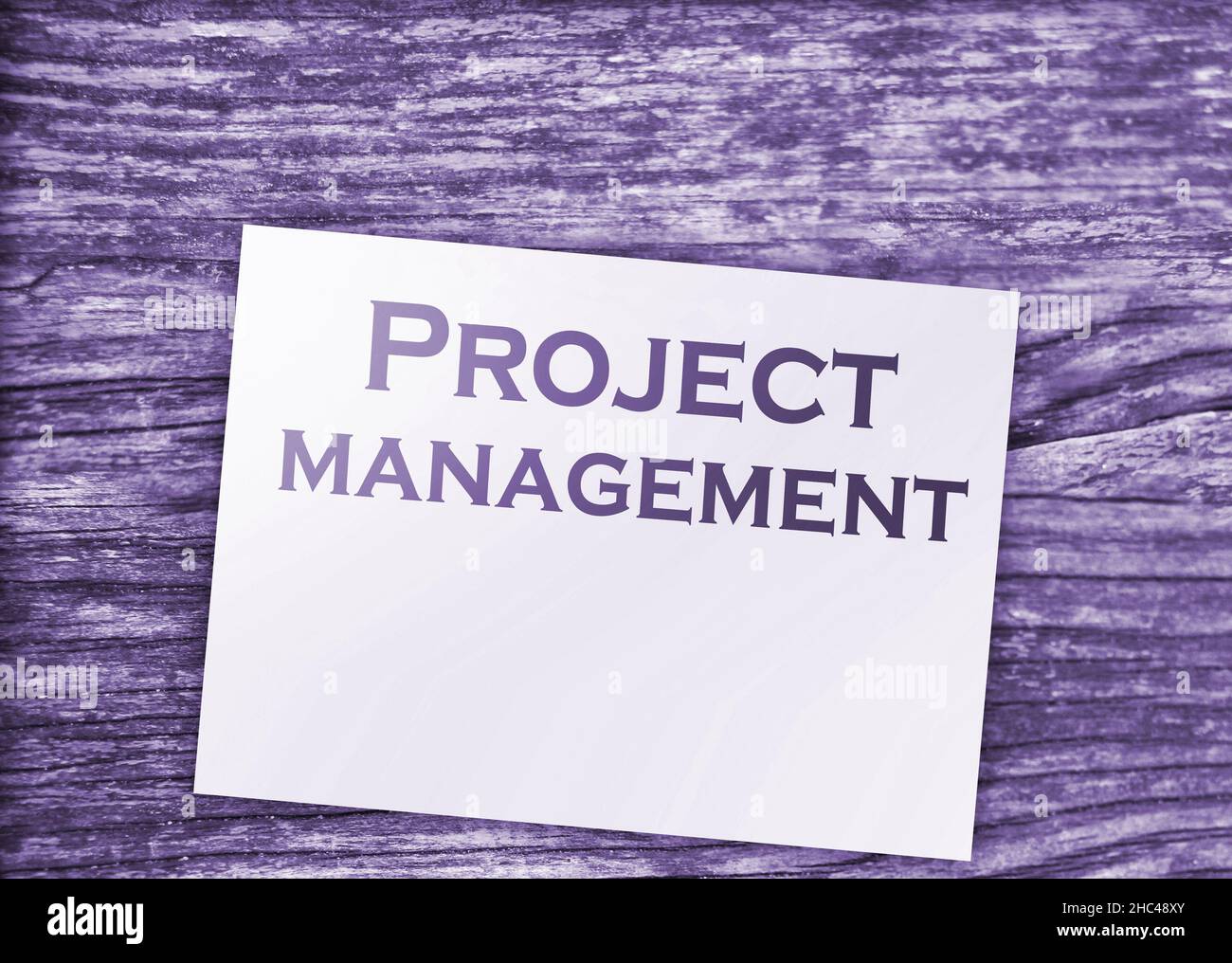 Project management text on page on beautiful wooden background ...