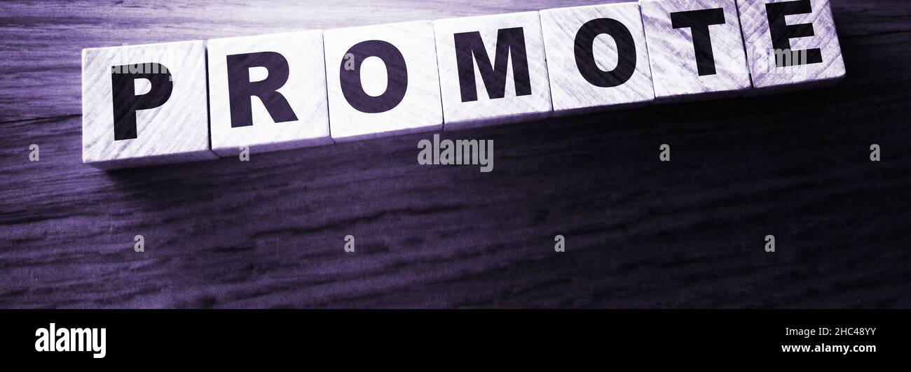 Promote word on Wooden Blocks. Promotion advertising marketing ...
