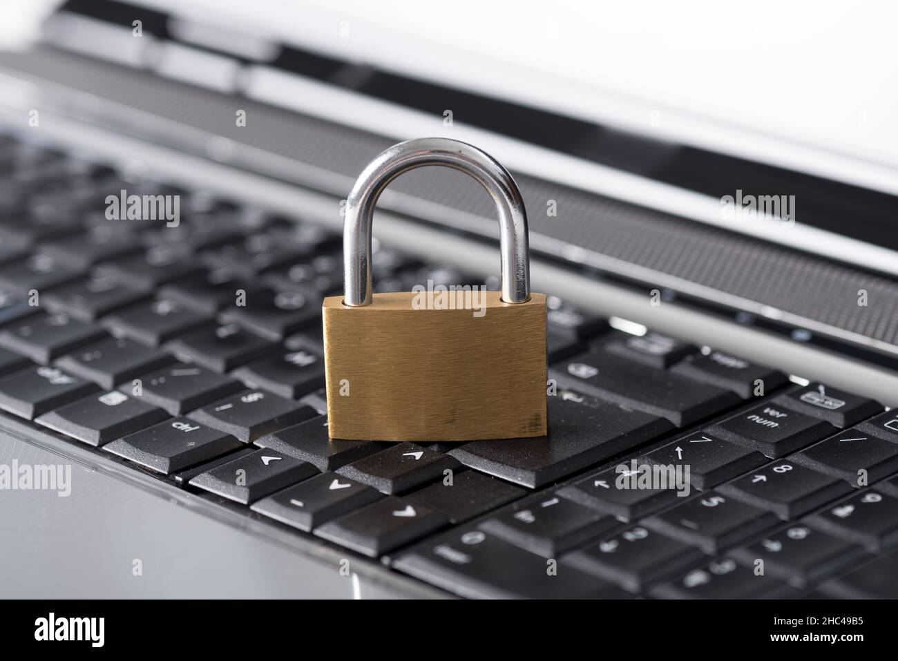 Computer security concept with a padlock on a keyboard Stock Photo - Alamy