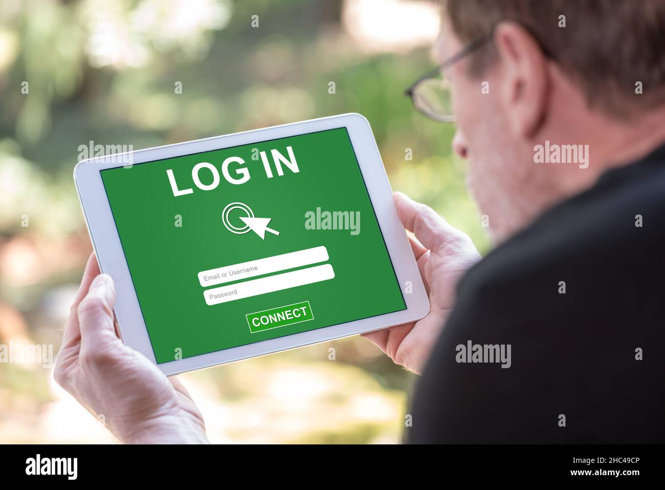 Tablet screen displaying a login concept Stock Photo - Alamy
