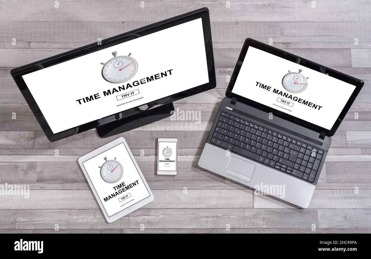 Time management concept shown on different information technology ...