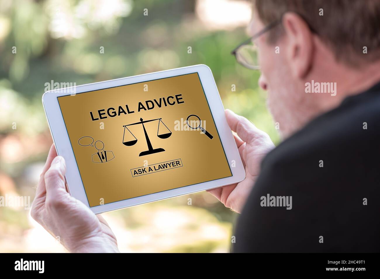 Tablet screen displaying a legal advice concept Stock Photo - Alamy