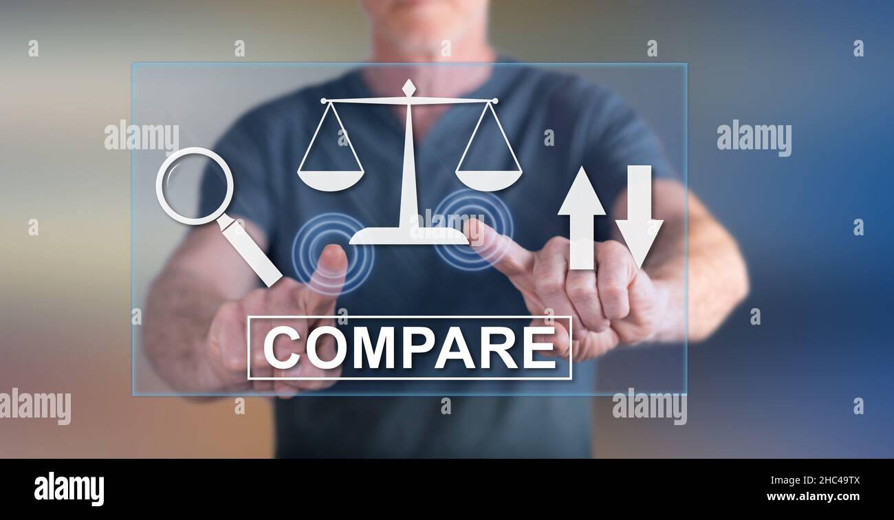 Man touching a compare concept on a touch screen with his finger Stock ...