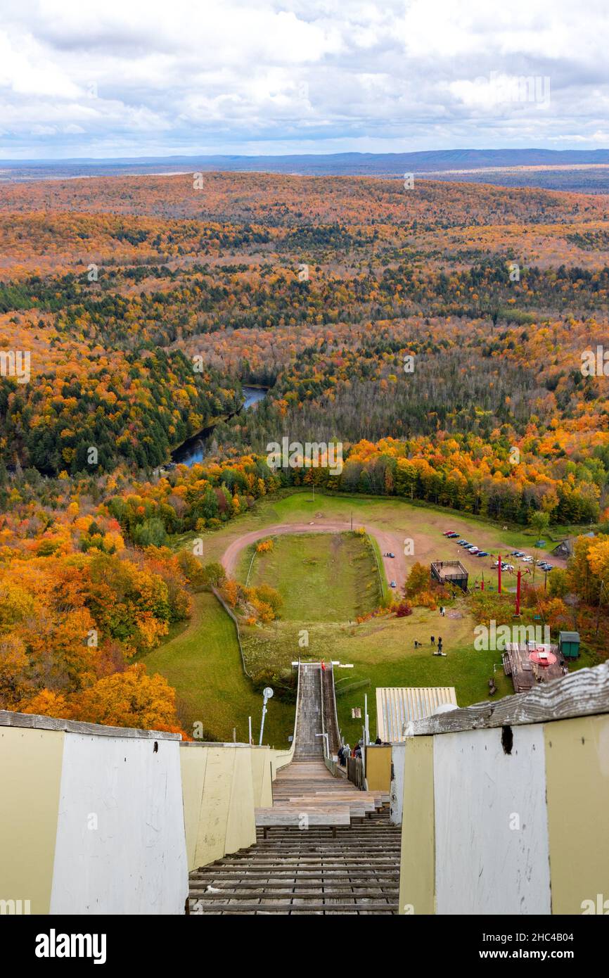 View from the Copper Peak in a forest under a cloudy sky in Michigan ...