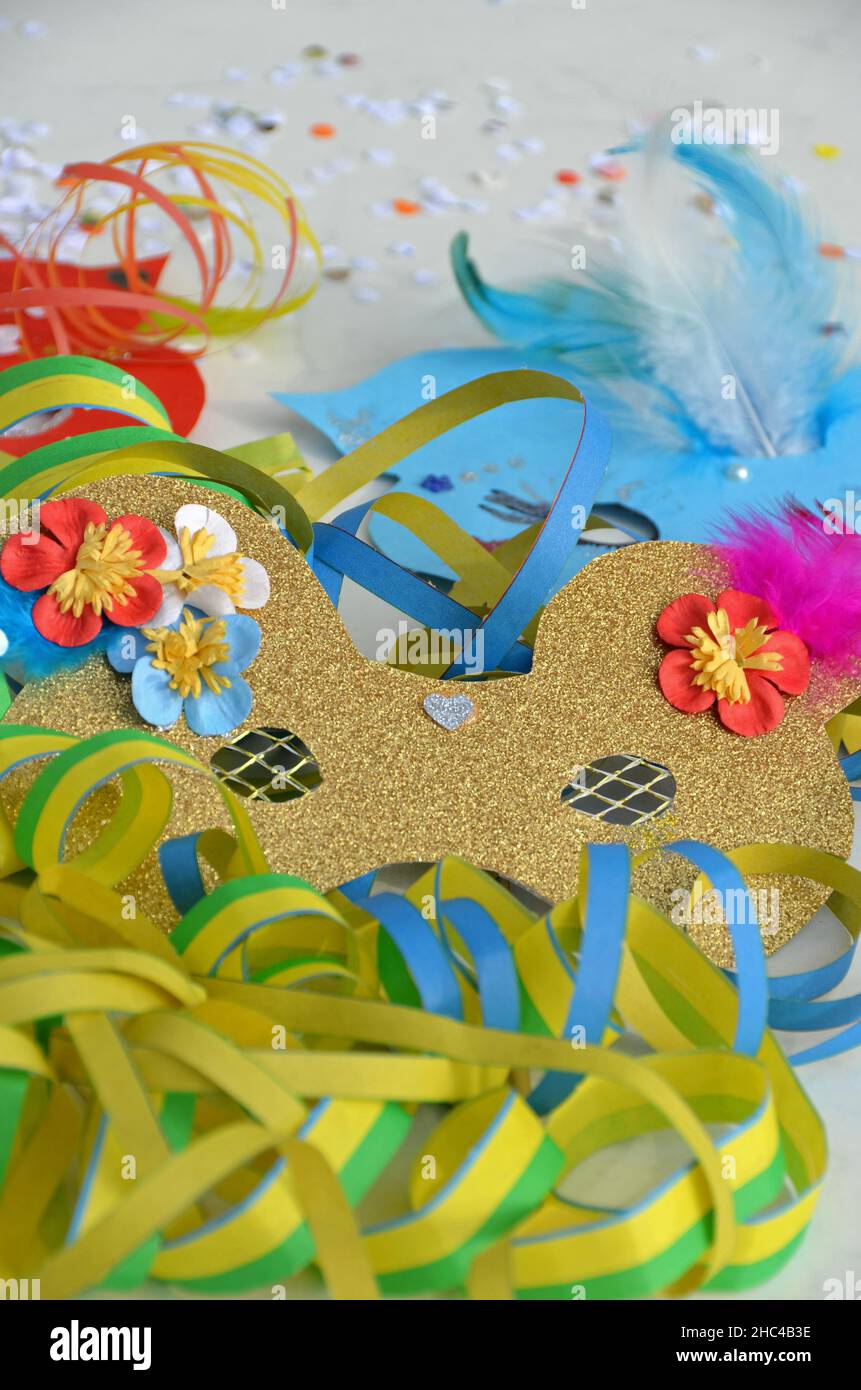 Carnival Masks With Paper Streamer And Confetti Stock Photo - Alamy