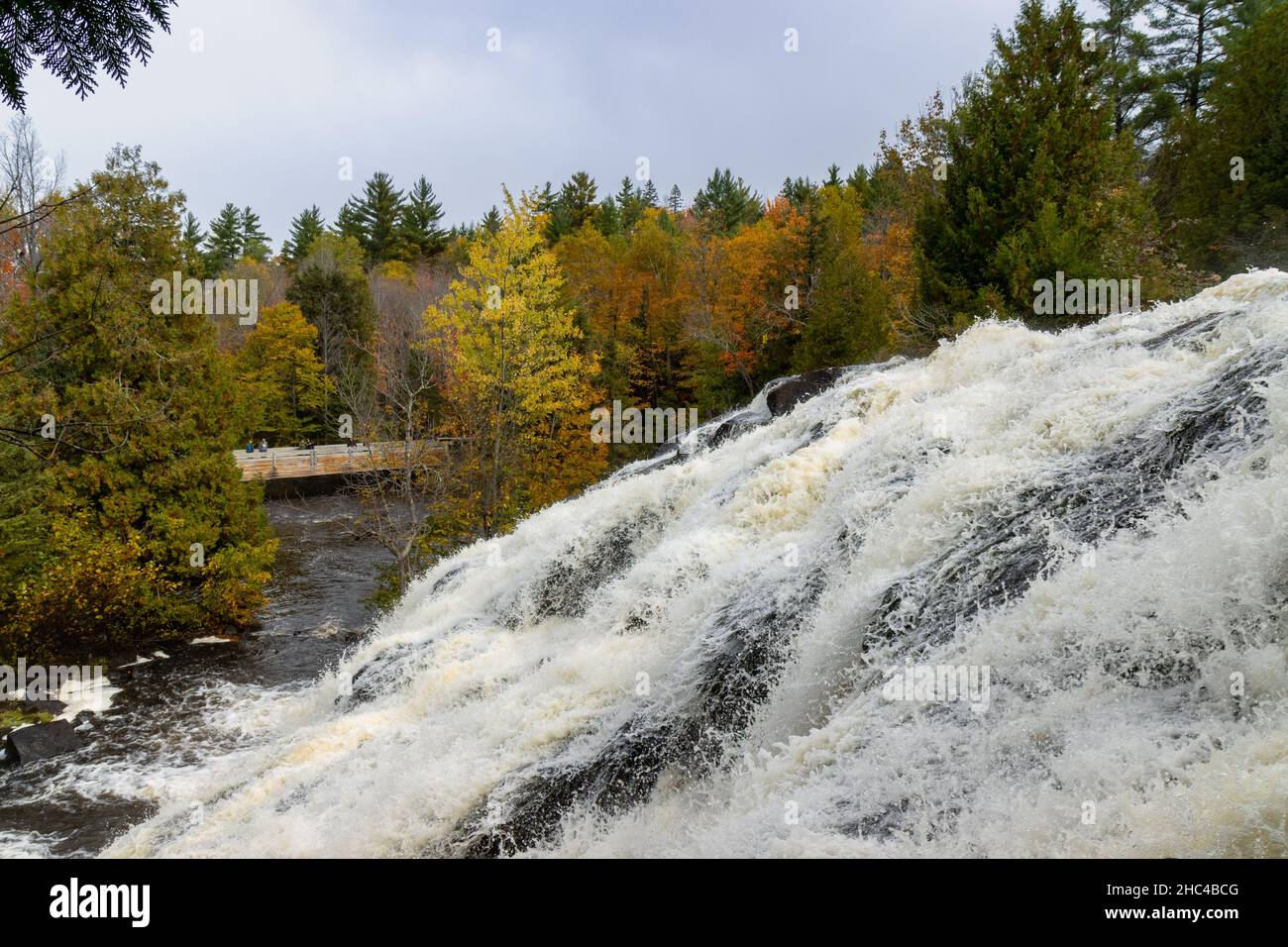 The Victoria Dam surrounded by yellowing plants in autumn in Michigan ...