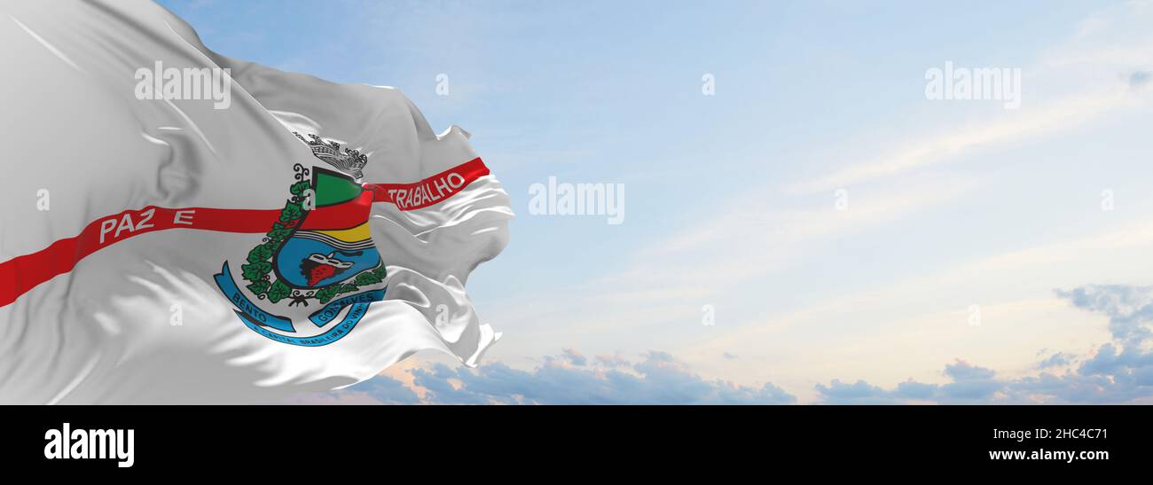 flag of Bento Goncalves , Brazil at cloudy sky background on sunset ...