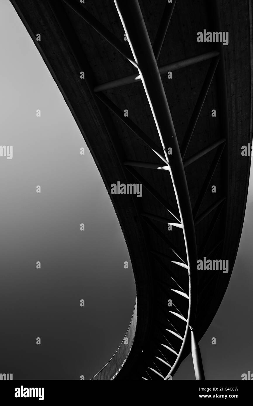 Vertical grayscale shot of the architectural details of a bridge Stock ...