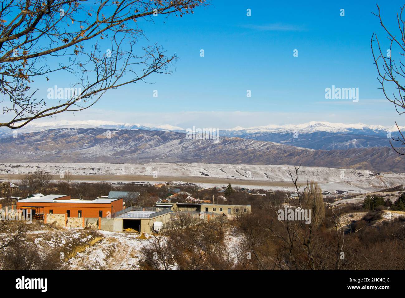 Mountain range winter landscape and view in Georgia Stock Photo - Alamy